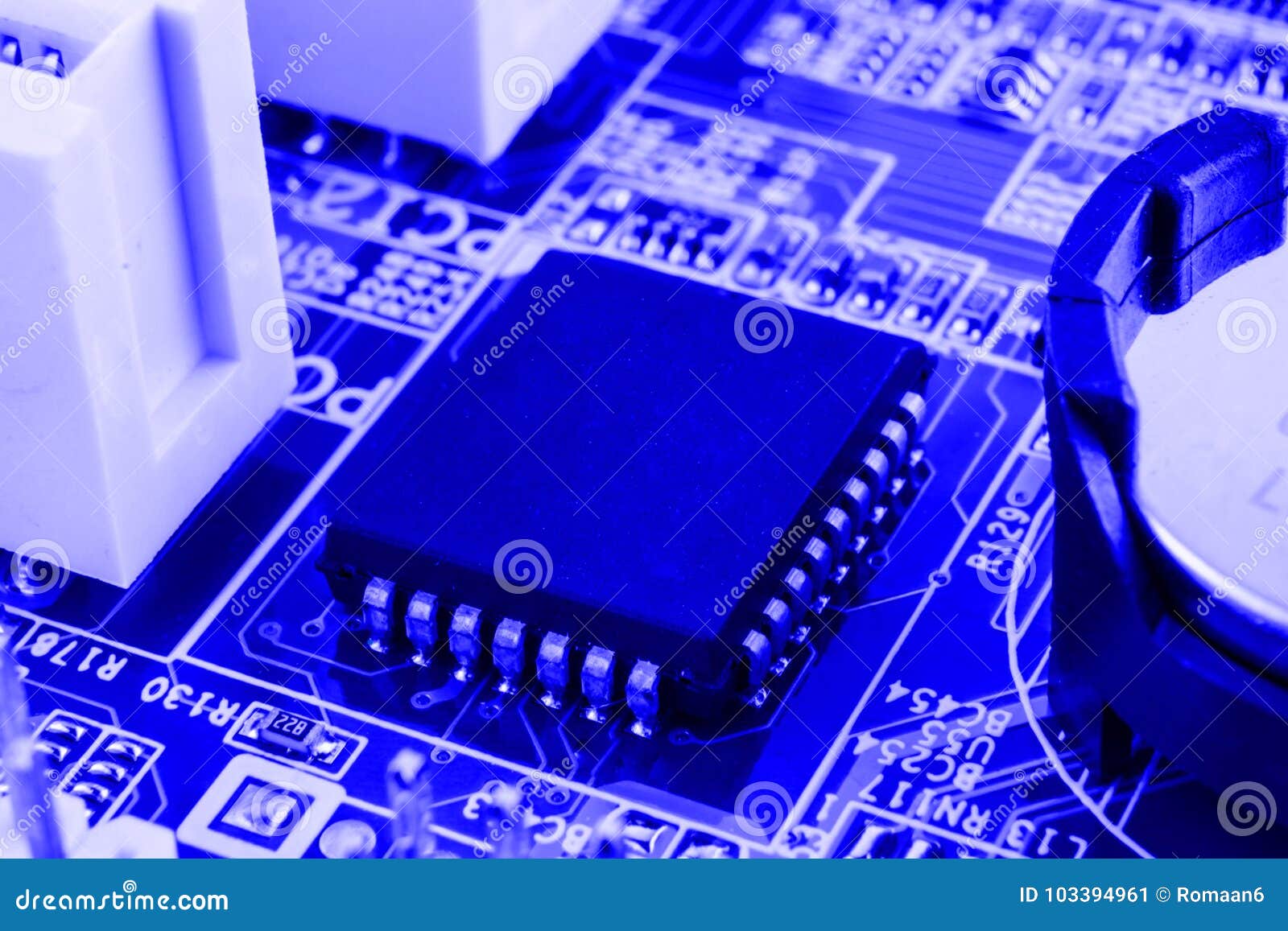 Integrated Semiconductor Microchip on Blue Circuit Board Representative ...
