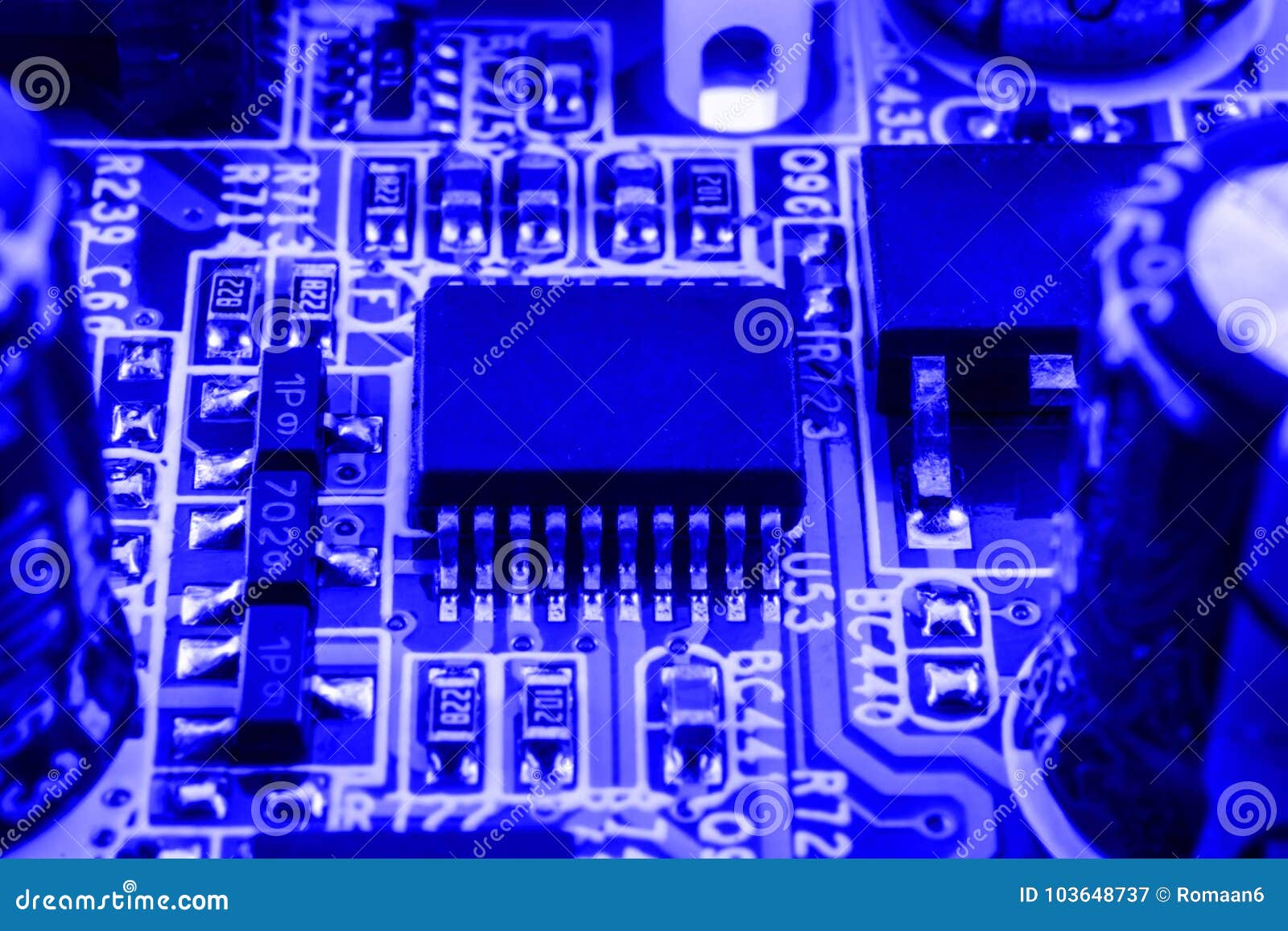 Integrated Semiconductor Microchip on Blue Circuit Board Representative ...