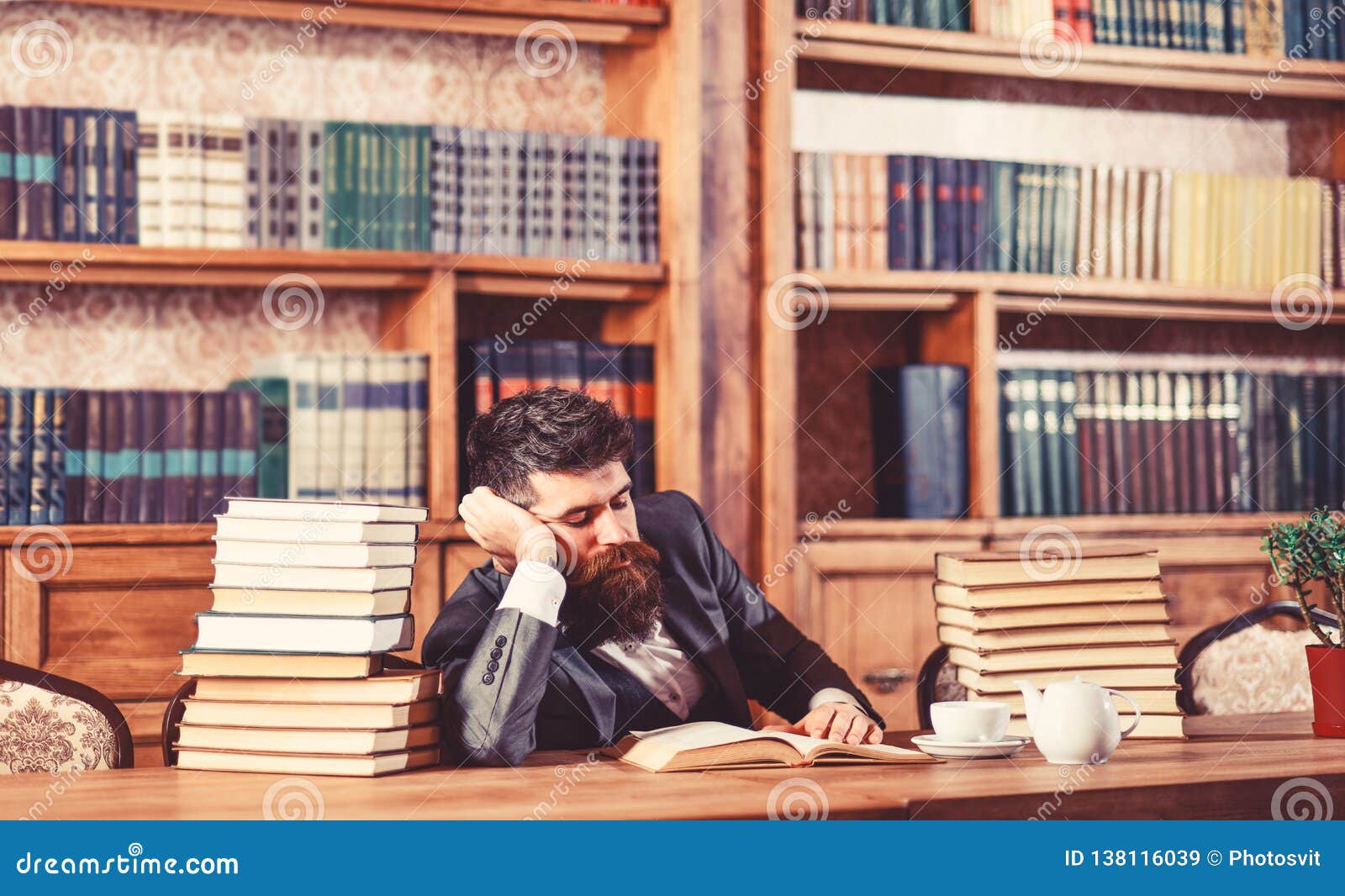 Intellectual Work Concept. Bearded Man in Library Has Intellectual Work ...