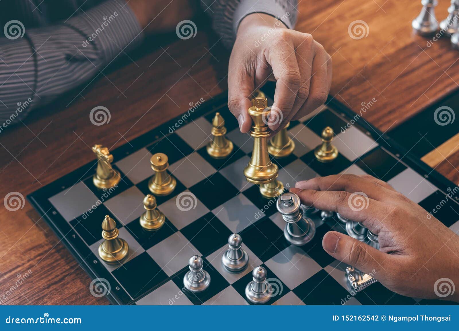 Intelligent Businessman Playing Chess Game Competition with the ... Intelligent Businessman Playing Chess Game Competition with the ...