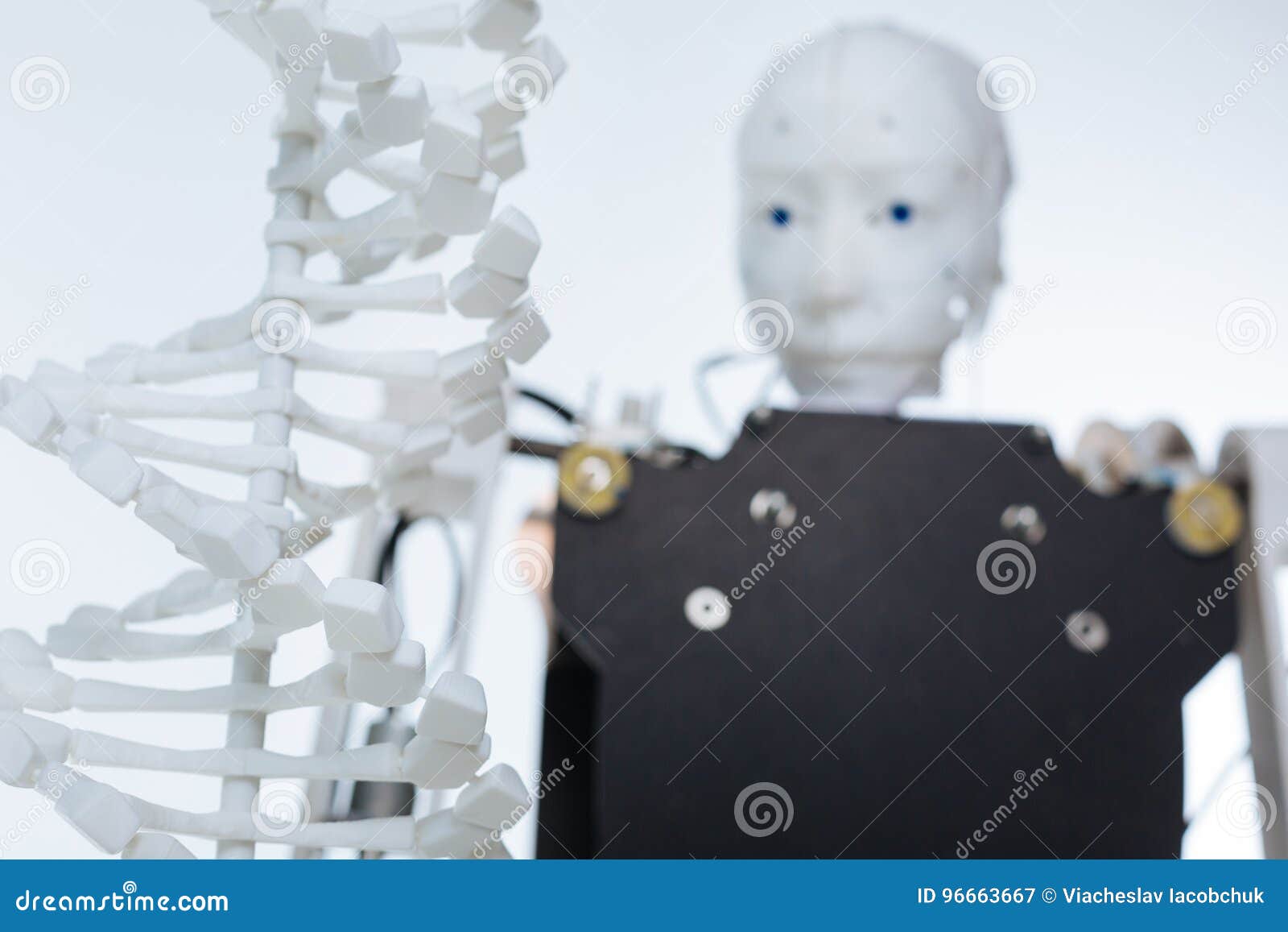 Intelligent Robot Staring at the Model of a DNA Stock Image - Image of ...