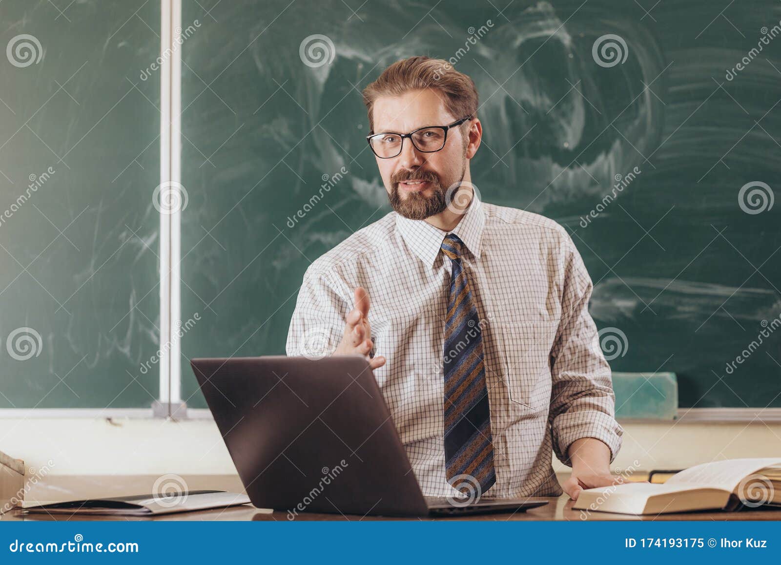 Intelligent Young Lecturer Using Laptop during Classes Stock Image ...