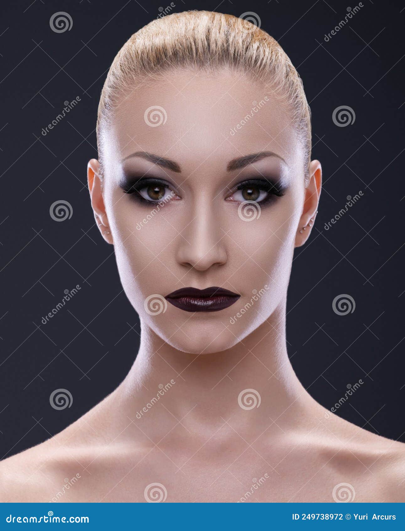 Intense Beauty. Cropped Portrait of a Young Woman Wearing Dark Makeup ... Intense Beauty. Cropped Portrait of a Young Woman Wearing Dark Makeup ...