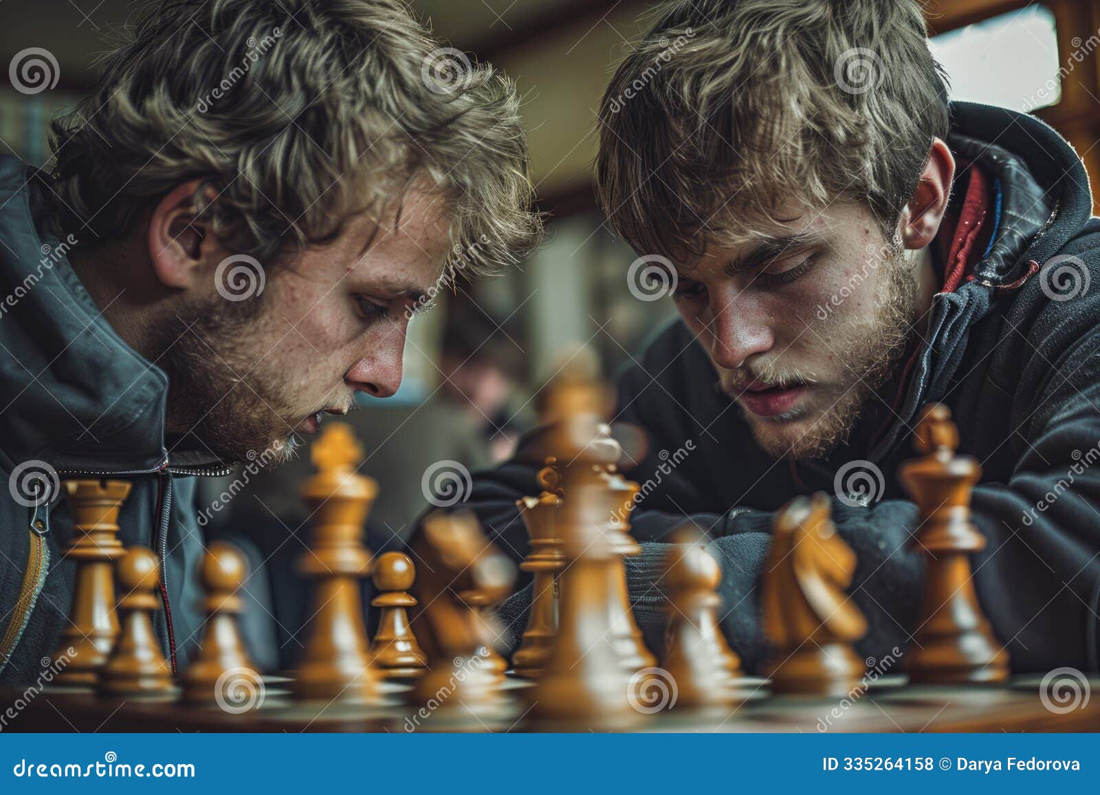 Intense Focus on Chess Strategy, Player Staring at Board, Competitive ...
