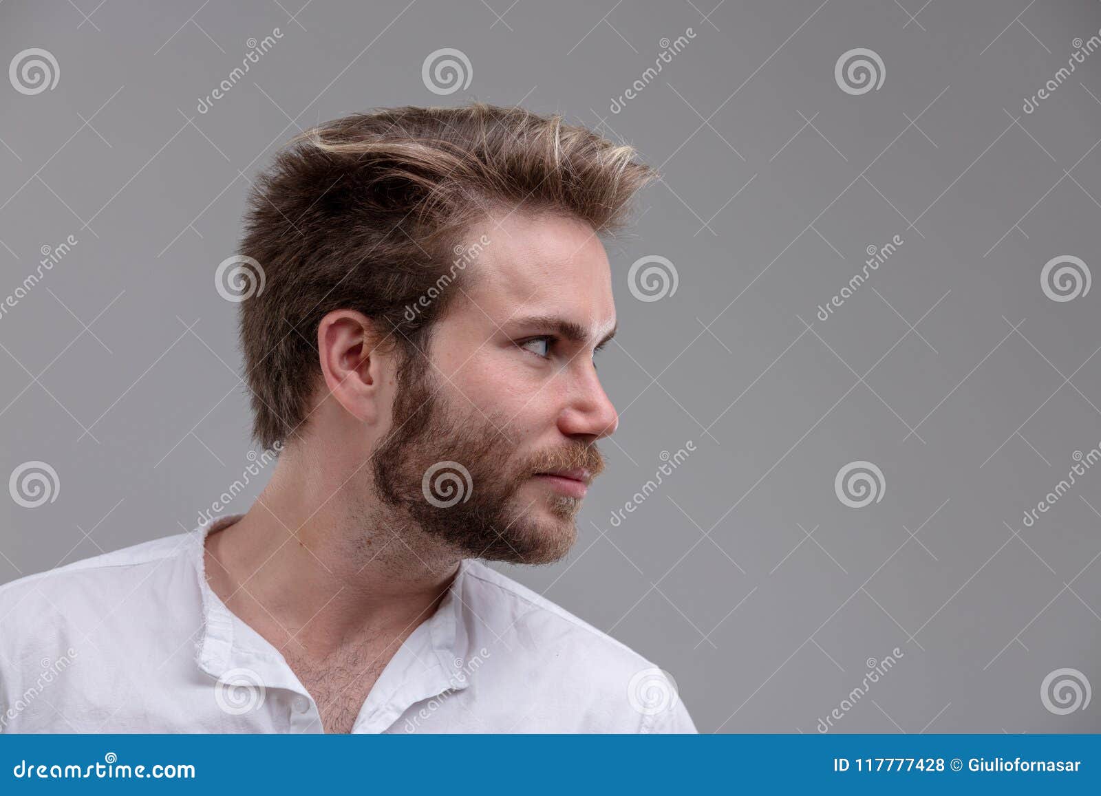 Intense Handsome Young Man Looking To the Side Stock Photo - Image of ...