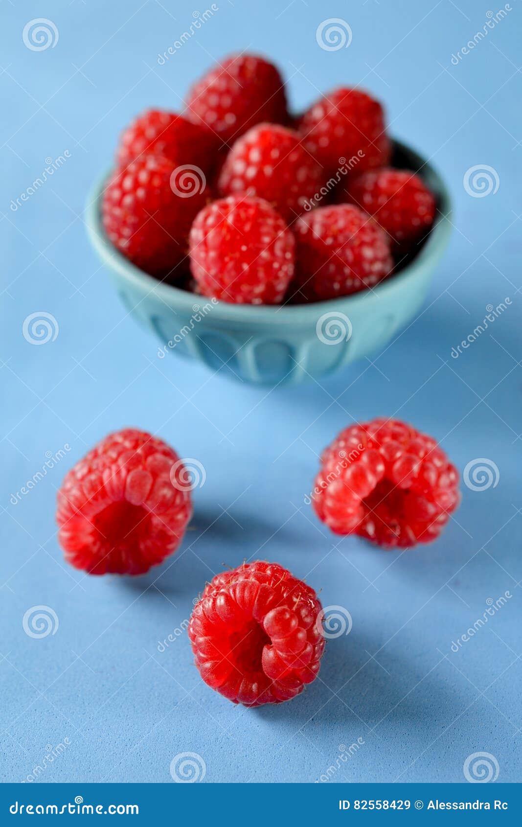 Intense Red Raspberries on Blue Stock Image - Image of blue, berry ...