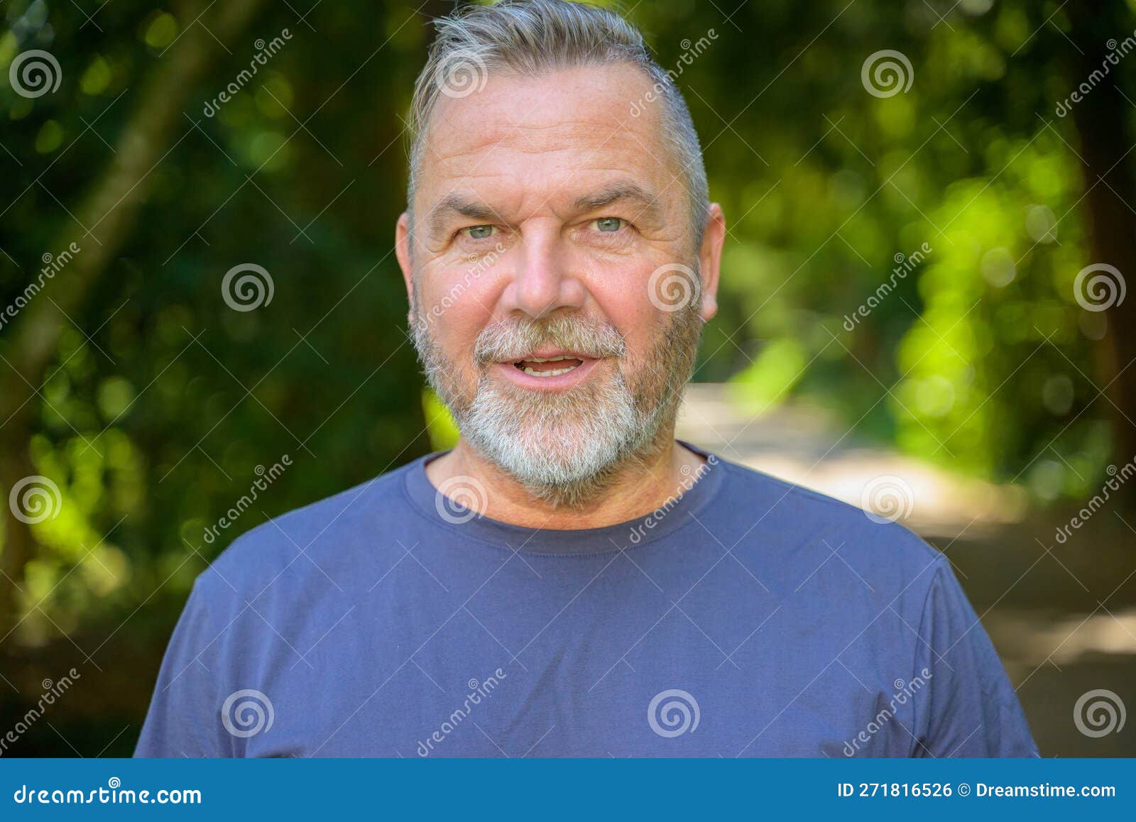 Intense Senior Man Looking into the Camera Stock Photo - Image of ...