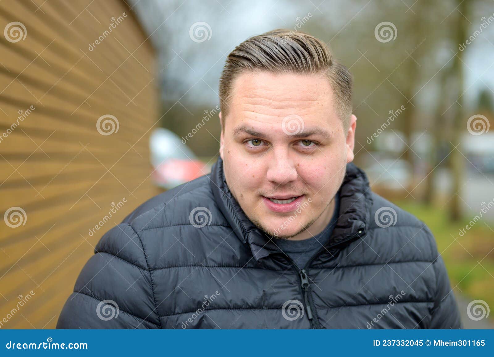 Intense Young Man Staring into the Camera with Parted Lips Stock Image ...