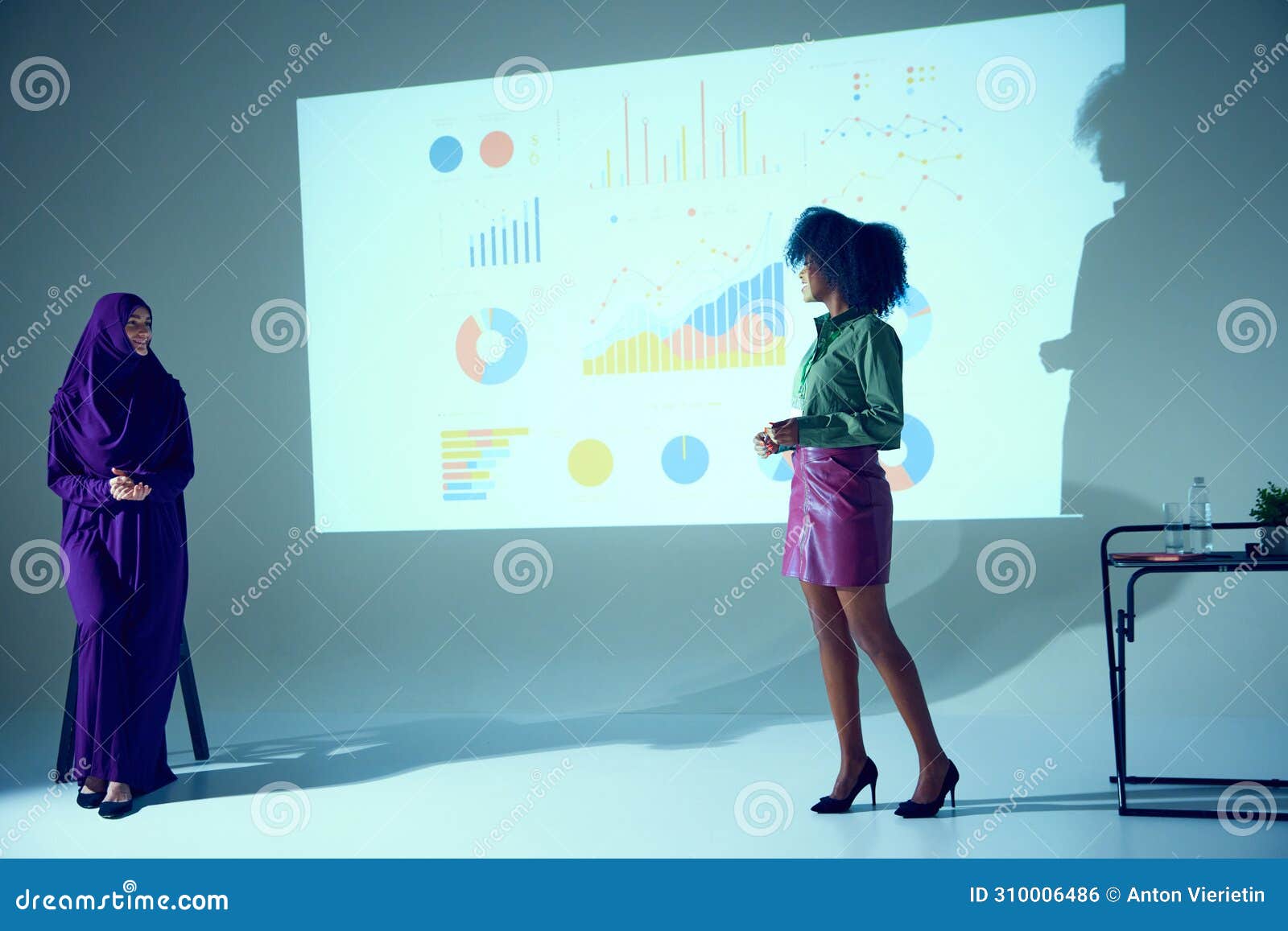 Interactive Session with Presenter in Hijab Engaging Audience, and ...