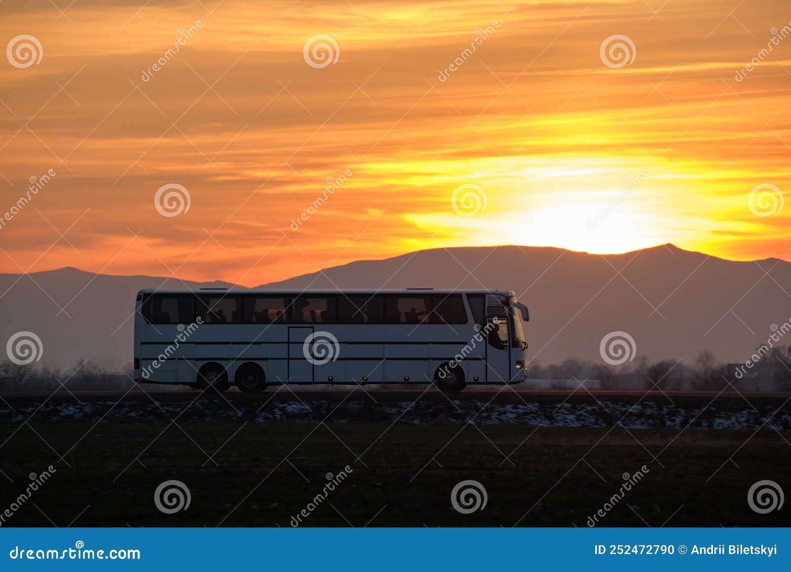 Intercity Passenger Bus Driving on Highway Road in Evening Stock Photo ...