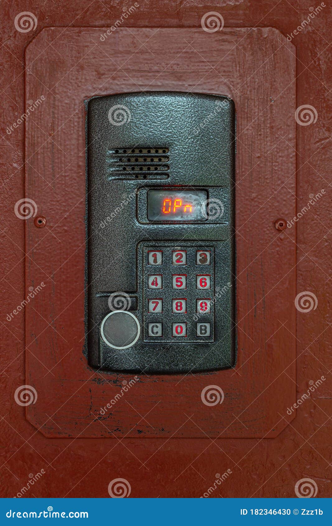 An Intercom on Old Painted Brown Steel Surface with a Keypad, Digital ...