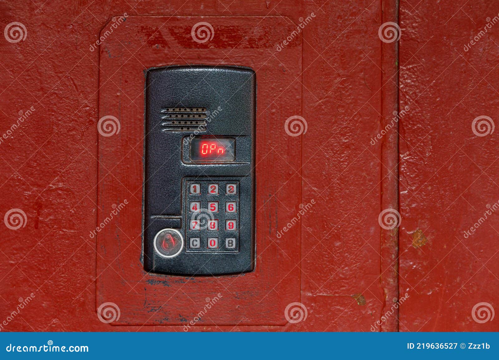 An Intercom on Old Painted Red Steel Surface with a Keypad, Digital ...