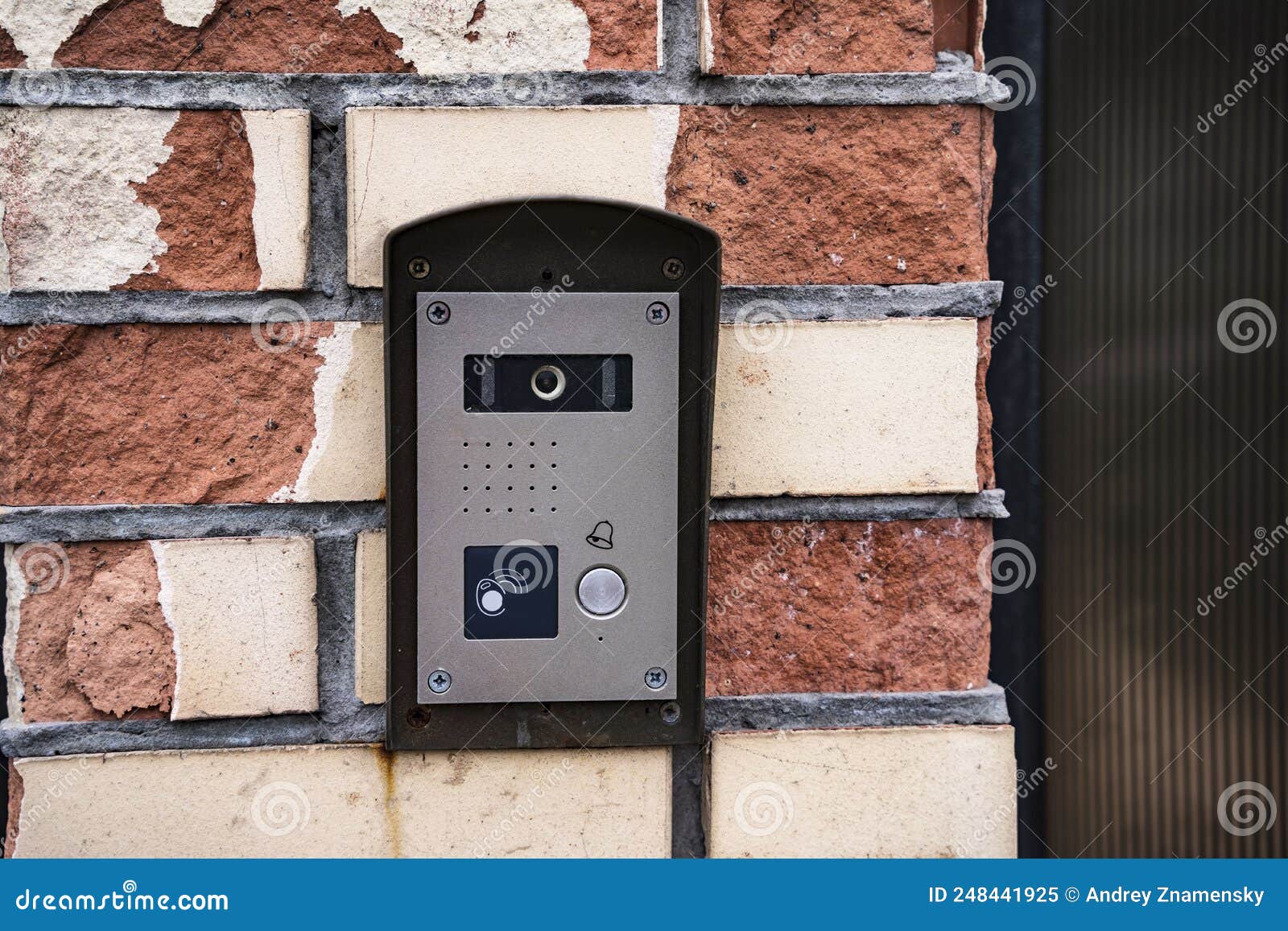 Intercom Panel with a Video Camera on the Brick Fence of Private House ...