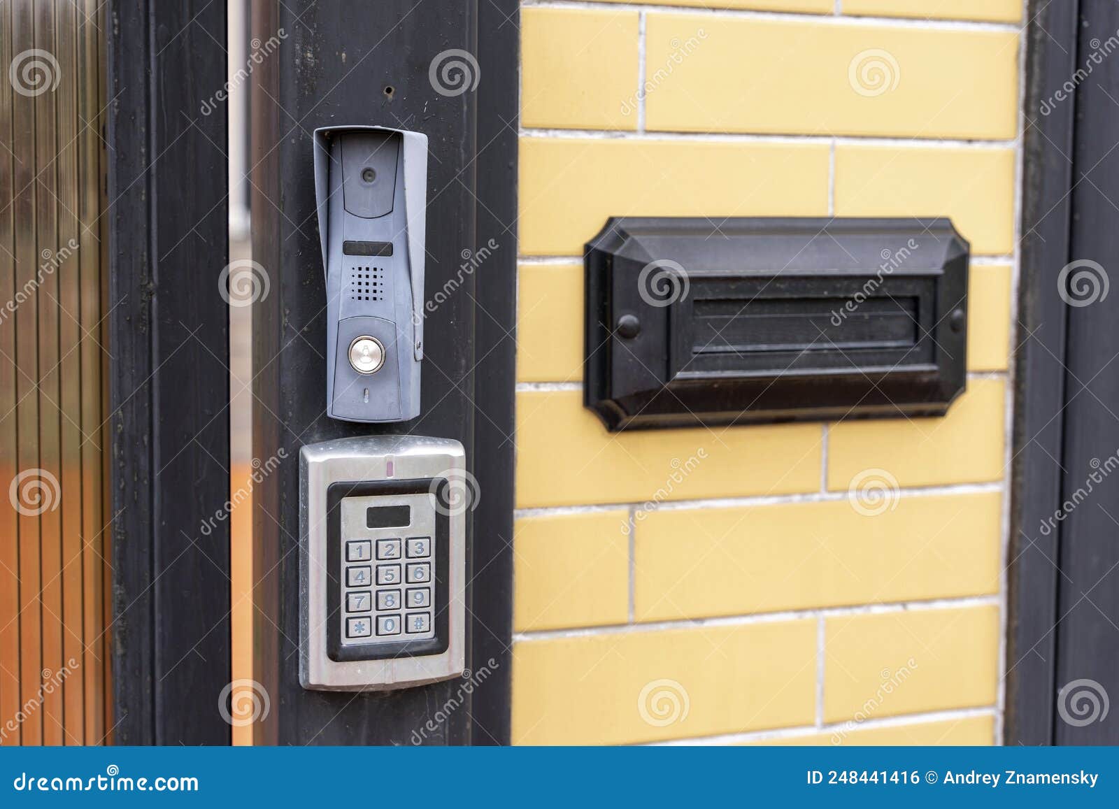 Intercom Panel with a Video Camera on the Brick Fence of Private House ...