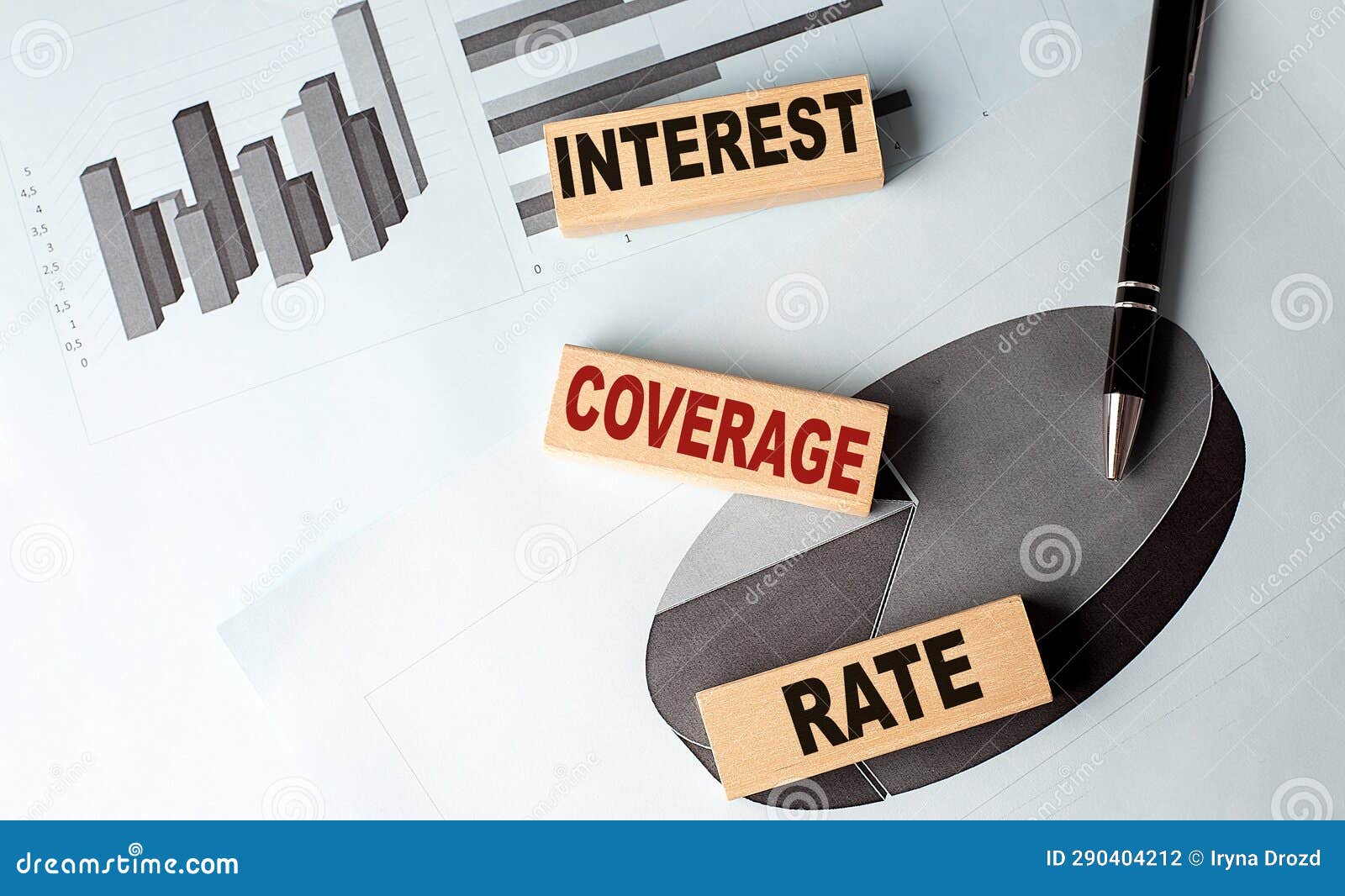 INTEREST COVERAGE RATE Text on Wooden Block on Chart Background Stock ...