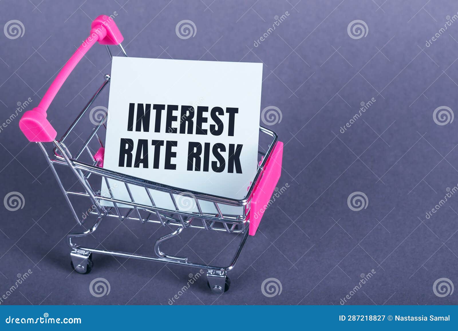 INTEREST RATE RISK Text on Paper Sticker, Gray Background Stock Image ...