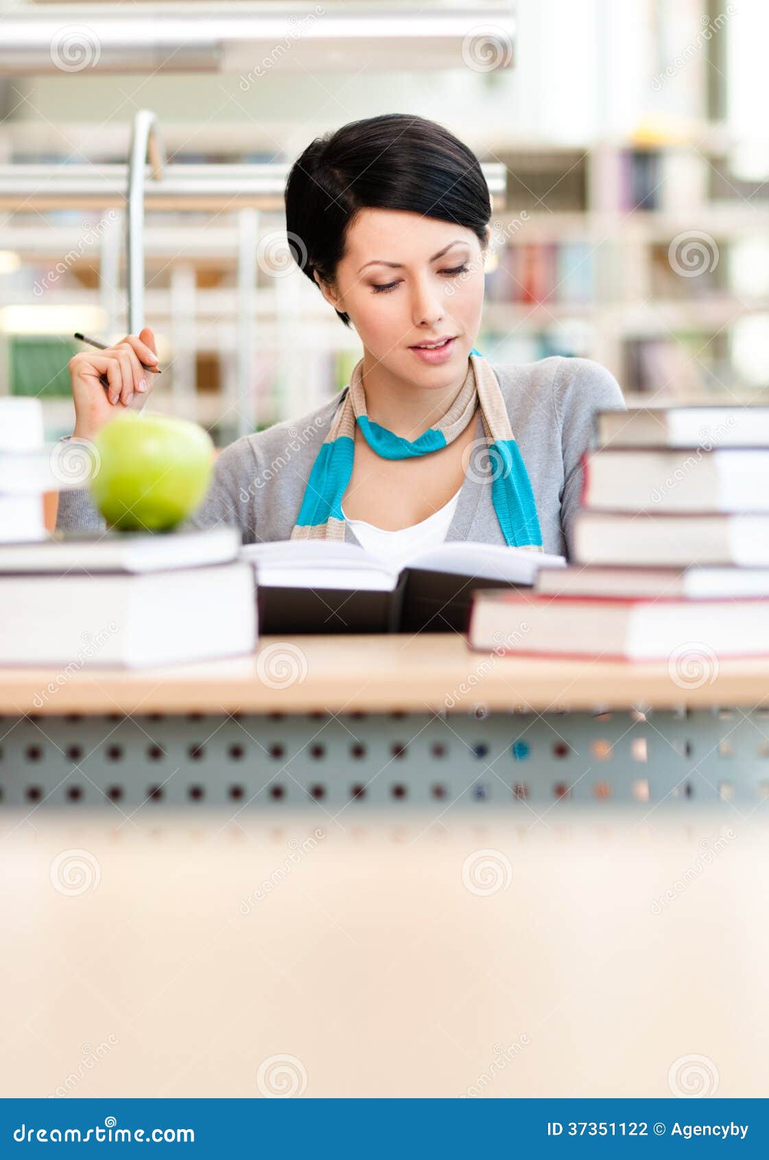 Interested Female Student Studies at the Desk Stock Photo - Image of ...