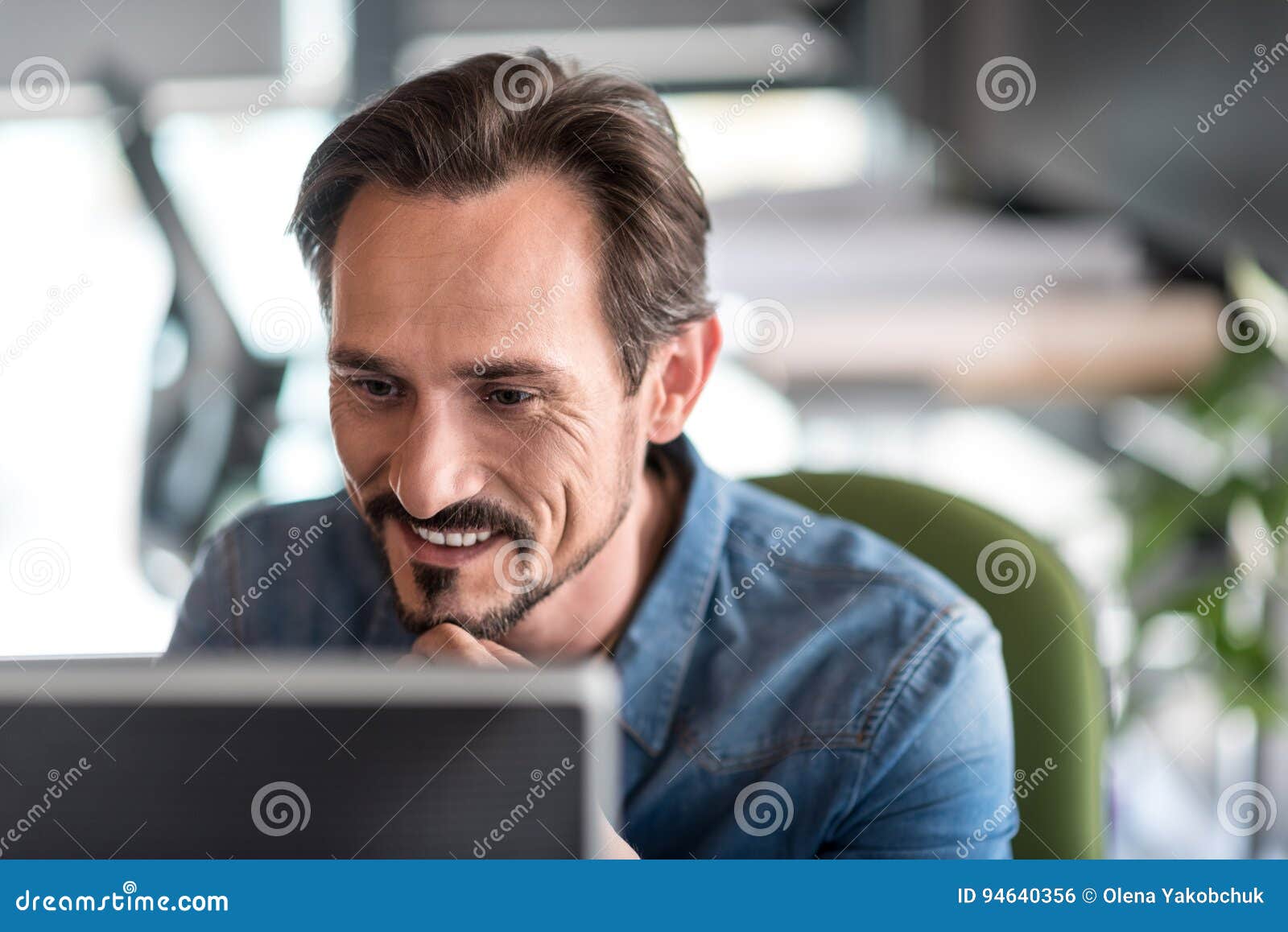 Interested Male Worker Sitting in Office Stock Photo - Image of face ...