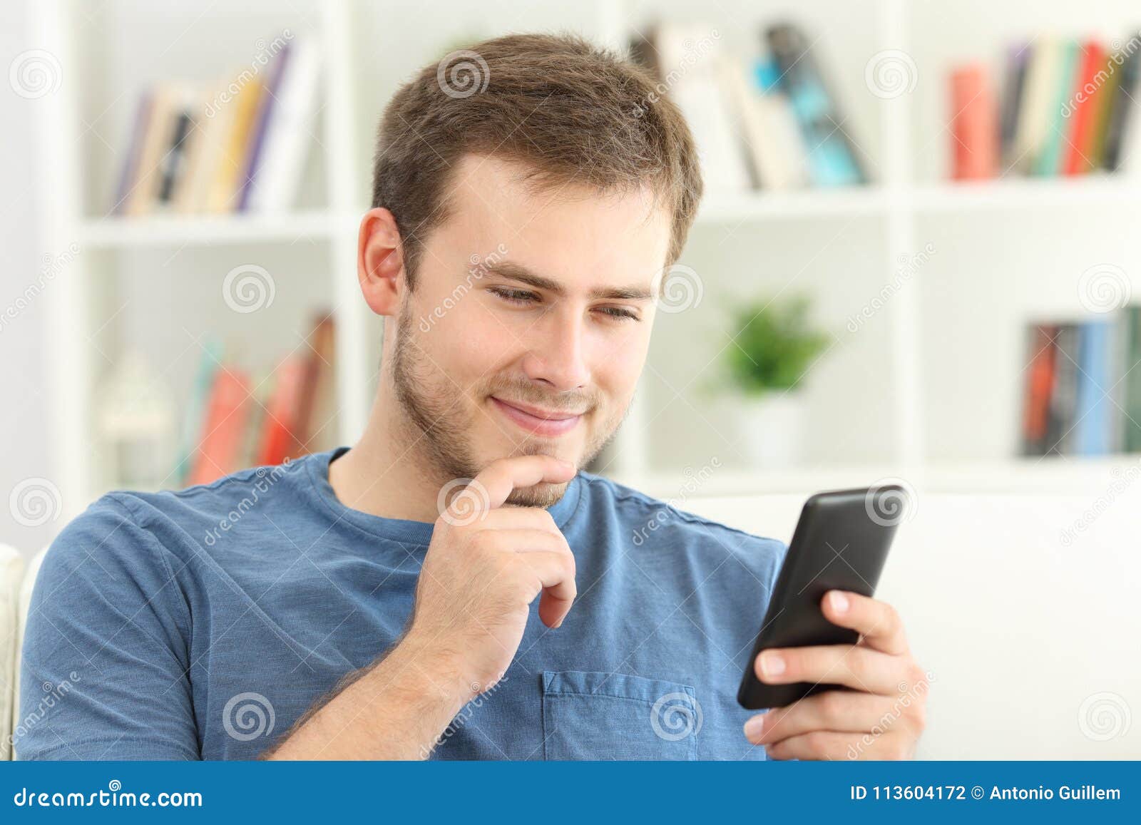 Interested Man Finding on Line Content on a Smart Phone Stock Photo ...