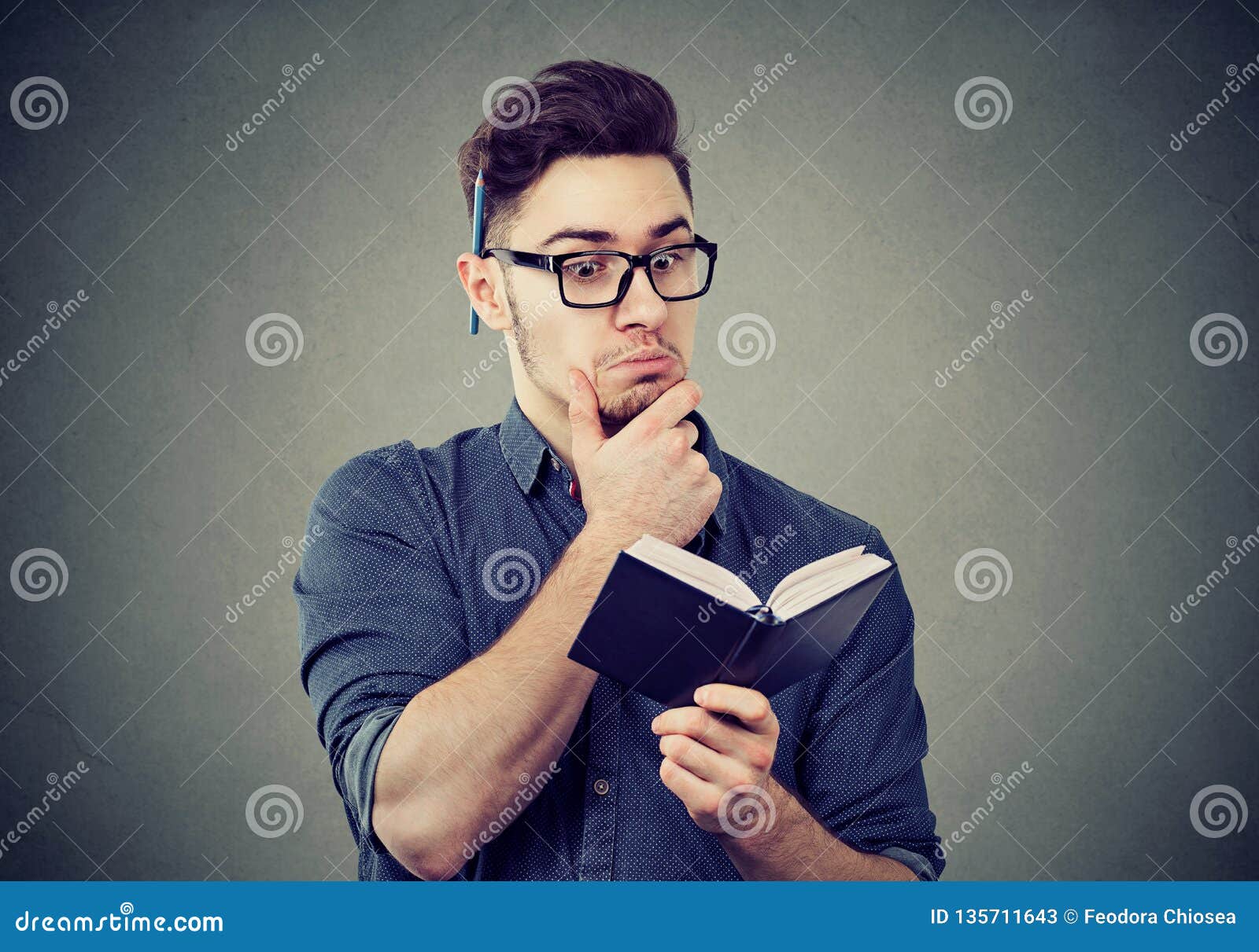 Interested Man Reading a Notepad Stock Image - Image of knowledge ...