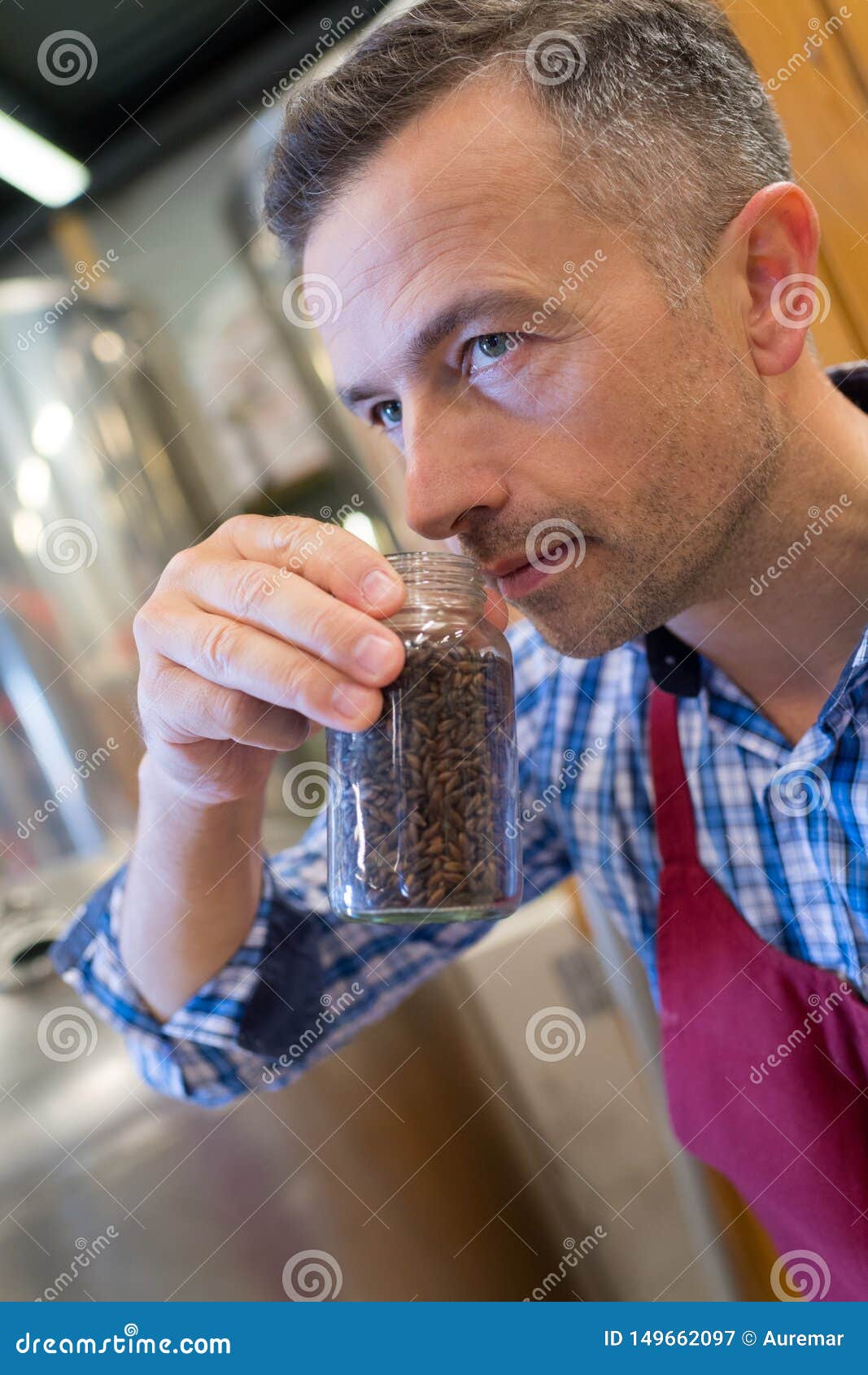 Interested Man Smelling Coffee Beans Stock Image - Image of crop, blend ...