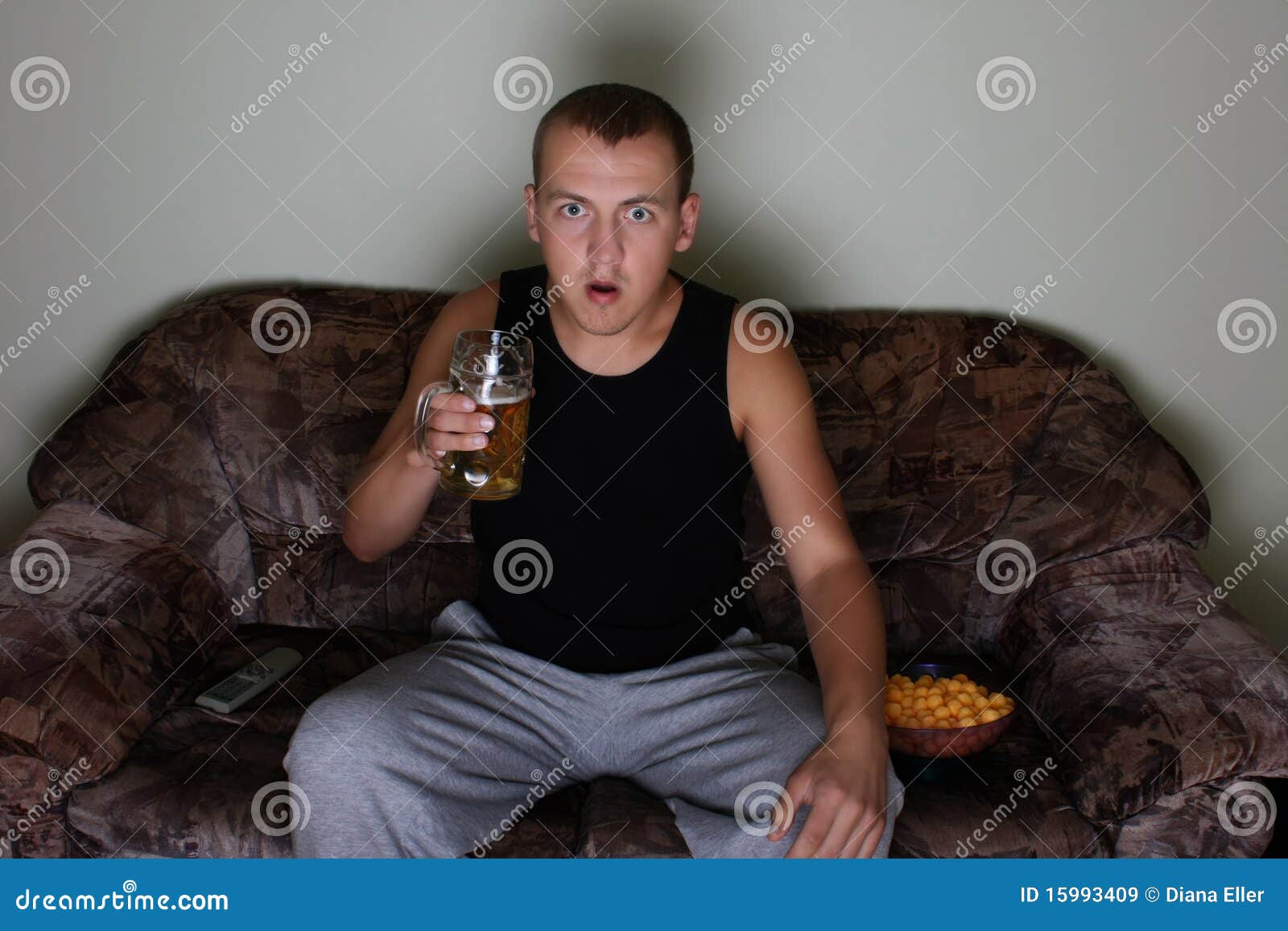 Interested Man Watching Tv with Beer and Chips Stock Image - Image of ...
