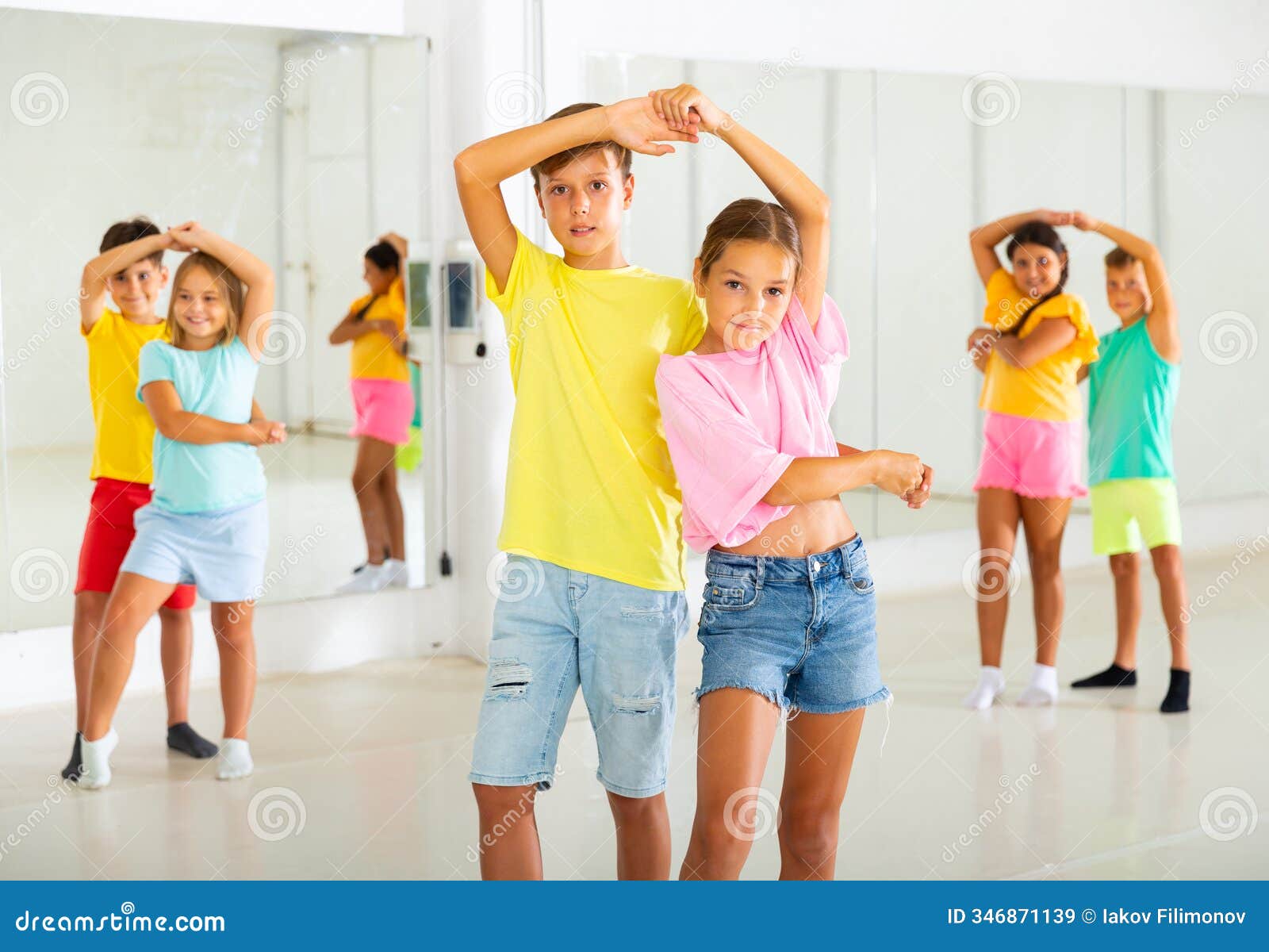 Tween Boy and Girl Practicing Slow Pair Dancing during Group Class ...