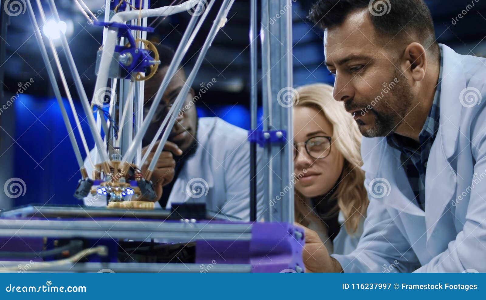 Researchers Watching 3-D Printing Machine in Process Stock Image ...