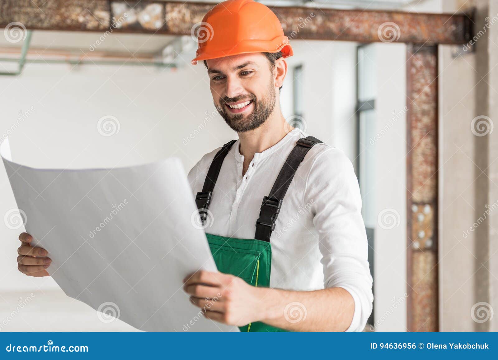 Interested Smiling Constructor Keeping Paper Stock Photo - Image of ...