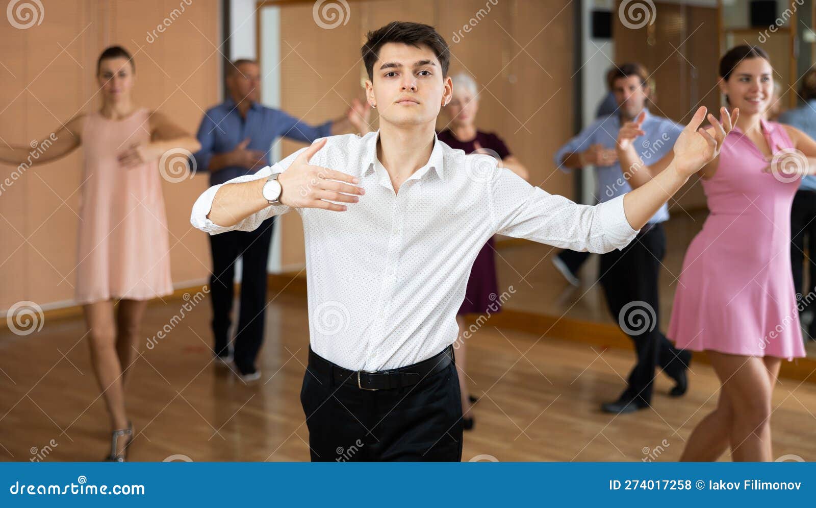 Guy Practicing Movements of Slow Dance during Group Class Stock Photo ...