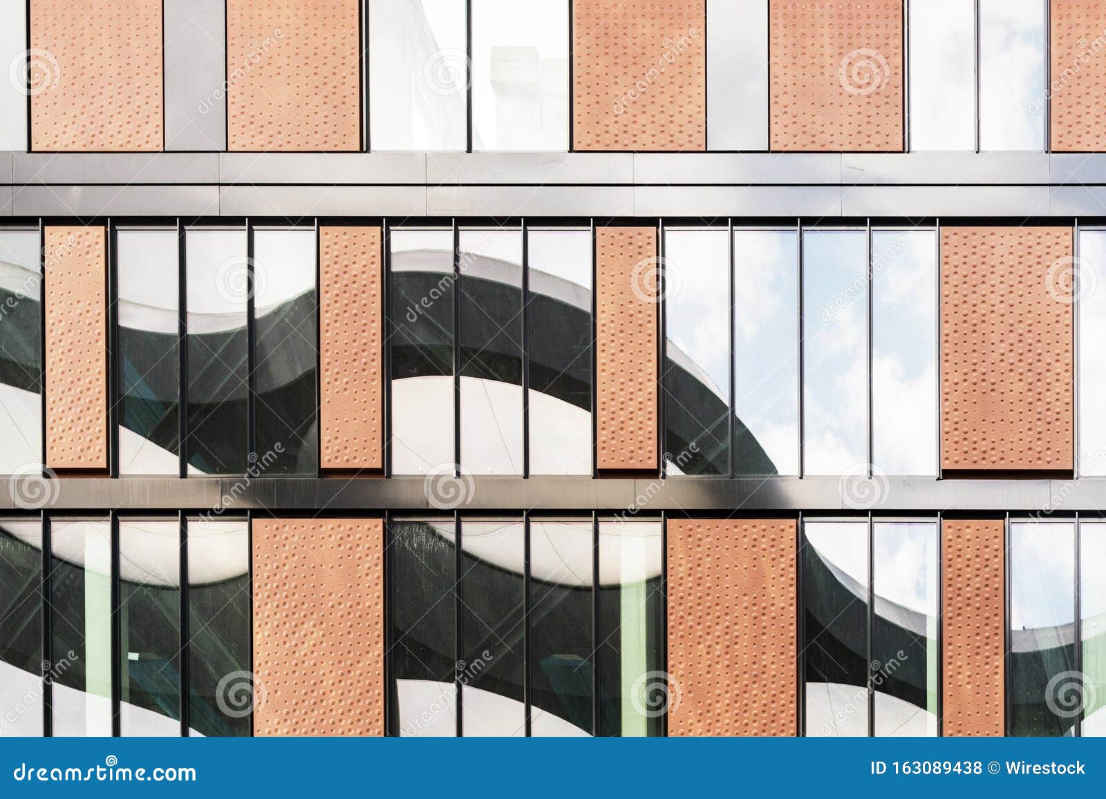 Interesting Architectural Twist on a Modern Building with Glass Windows ...