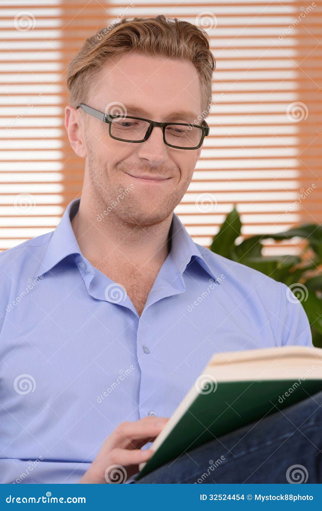 Interesting Book. Young Cheerful Men in Glasses Reading a Book Stock ...