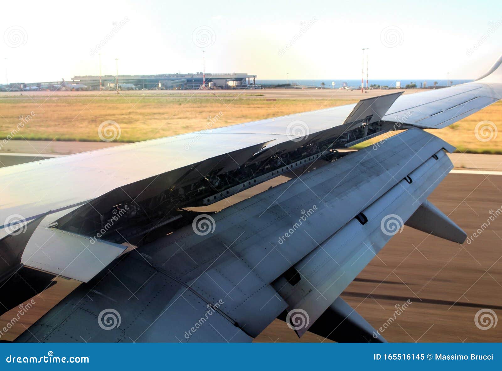 Detail of the Wing of a 737 Aircraft during the Landing Phase with the ...
