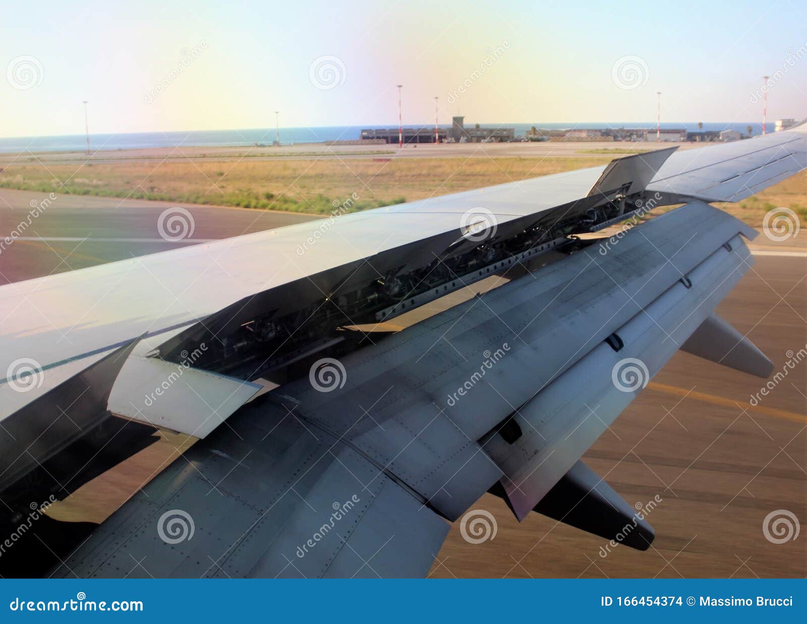 Detail of the Wing of a 737 Aircraft during the Landing Phase with the ...