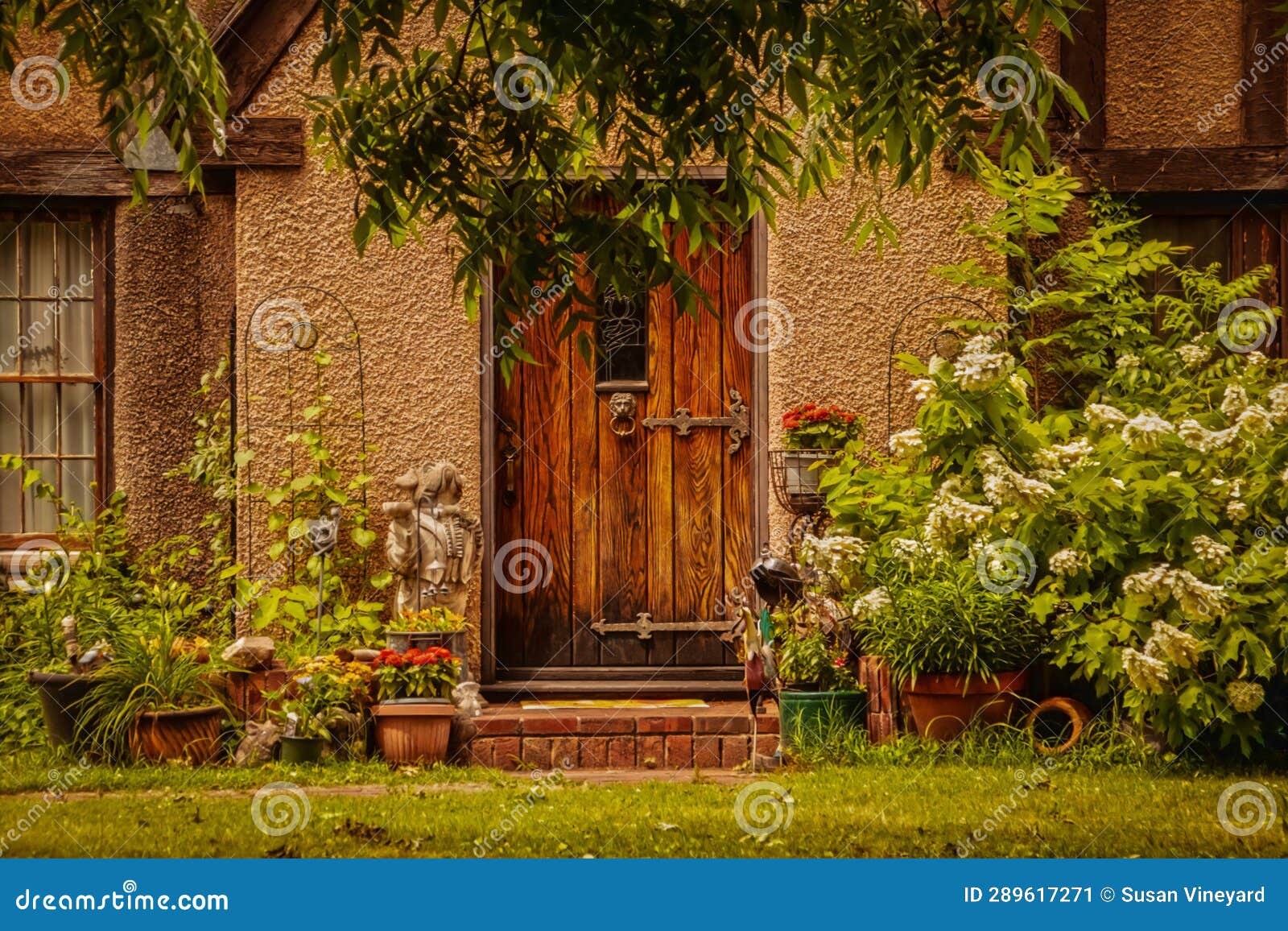 Interesting Medieval Front Door Hardware Landscaped with Tree Framing ...