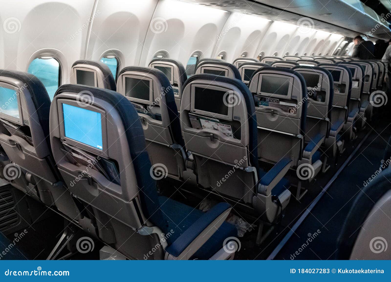 The Interior of the Aircraft. Empty Airplane Cabin Editorial Stock ...