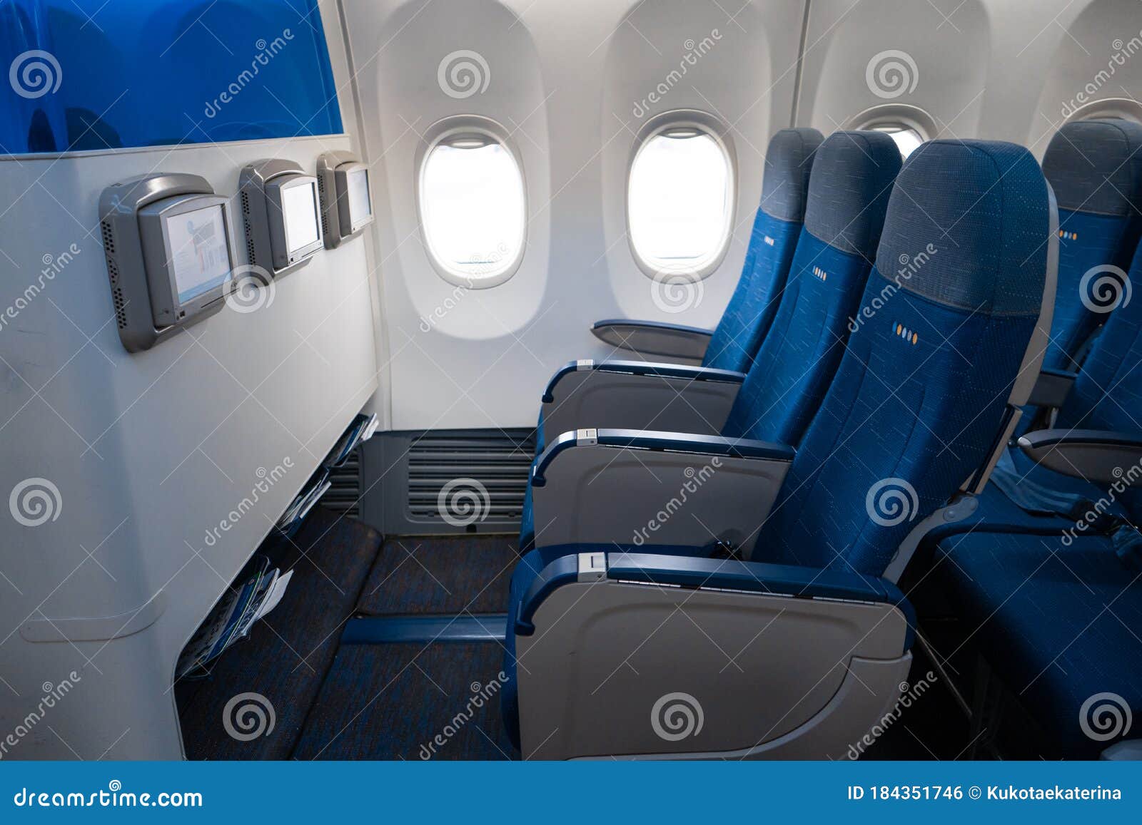 The Interior of the Aircraft. Empty Airplane Cabin Editorial Photo ...