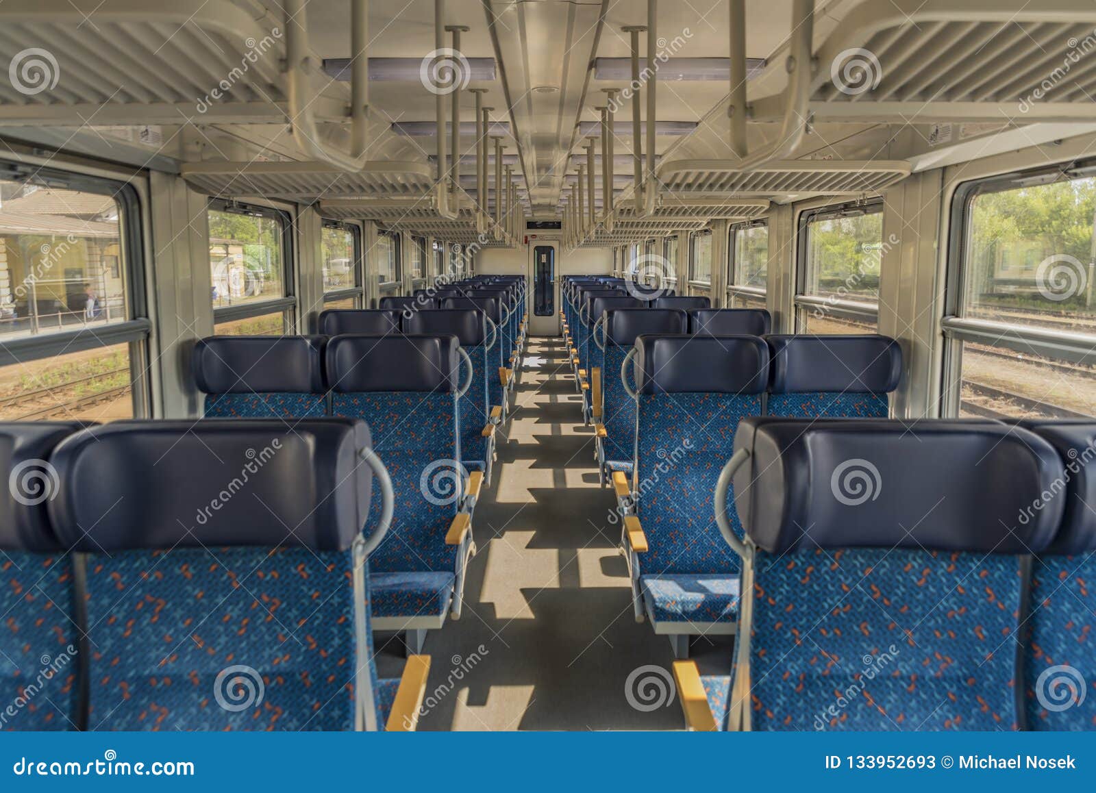 Interior of Blue Train with Blue Seat and Wooden Armrest Stock Image ...
