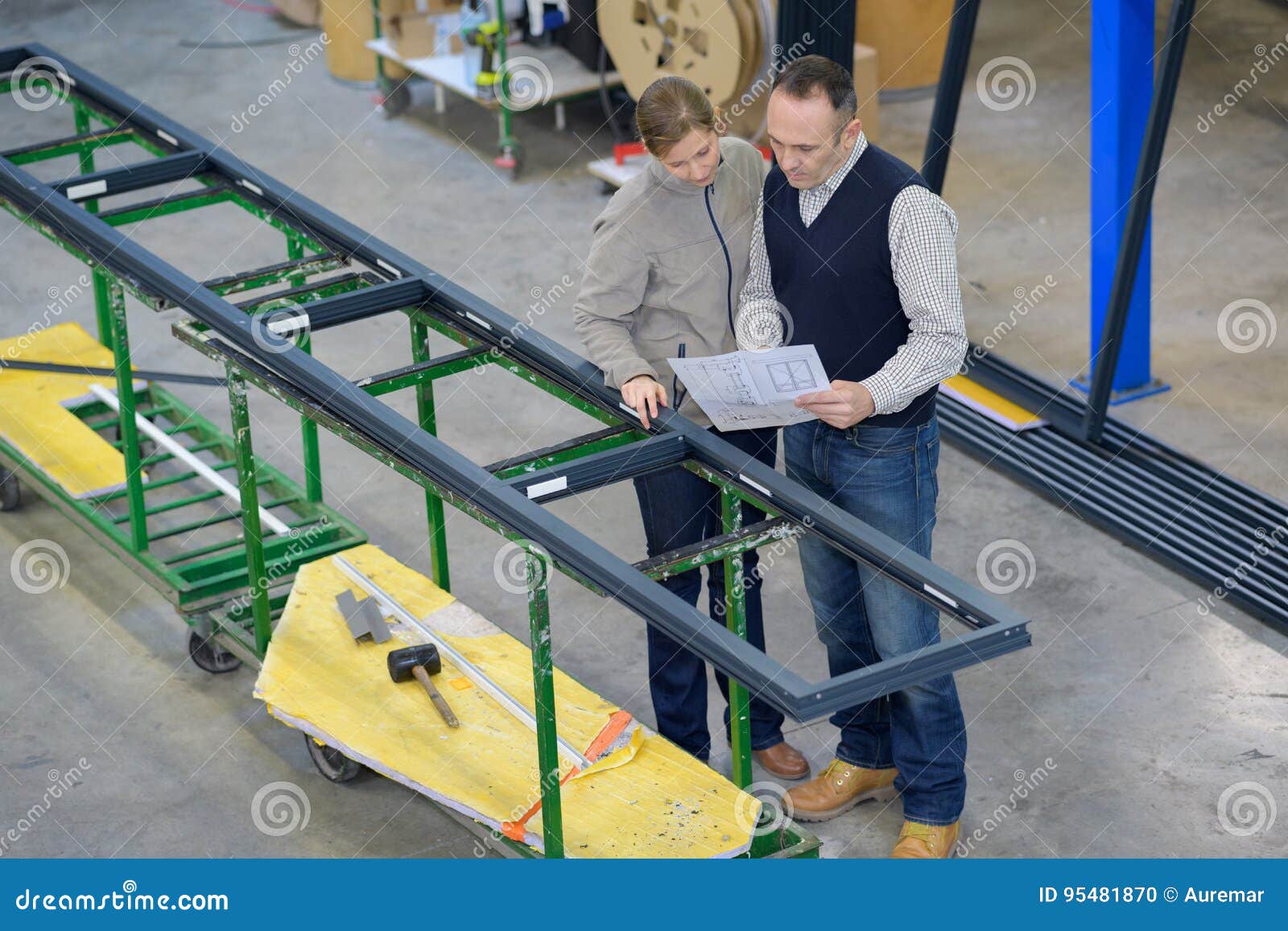 Interior Of Busy Factory With Staff At Work Benches Royalty-Free Stock ...