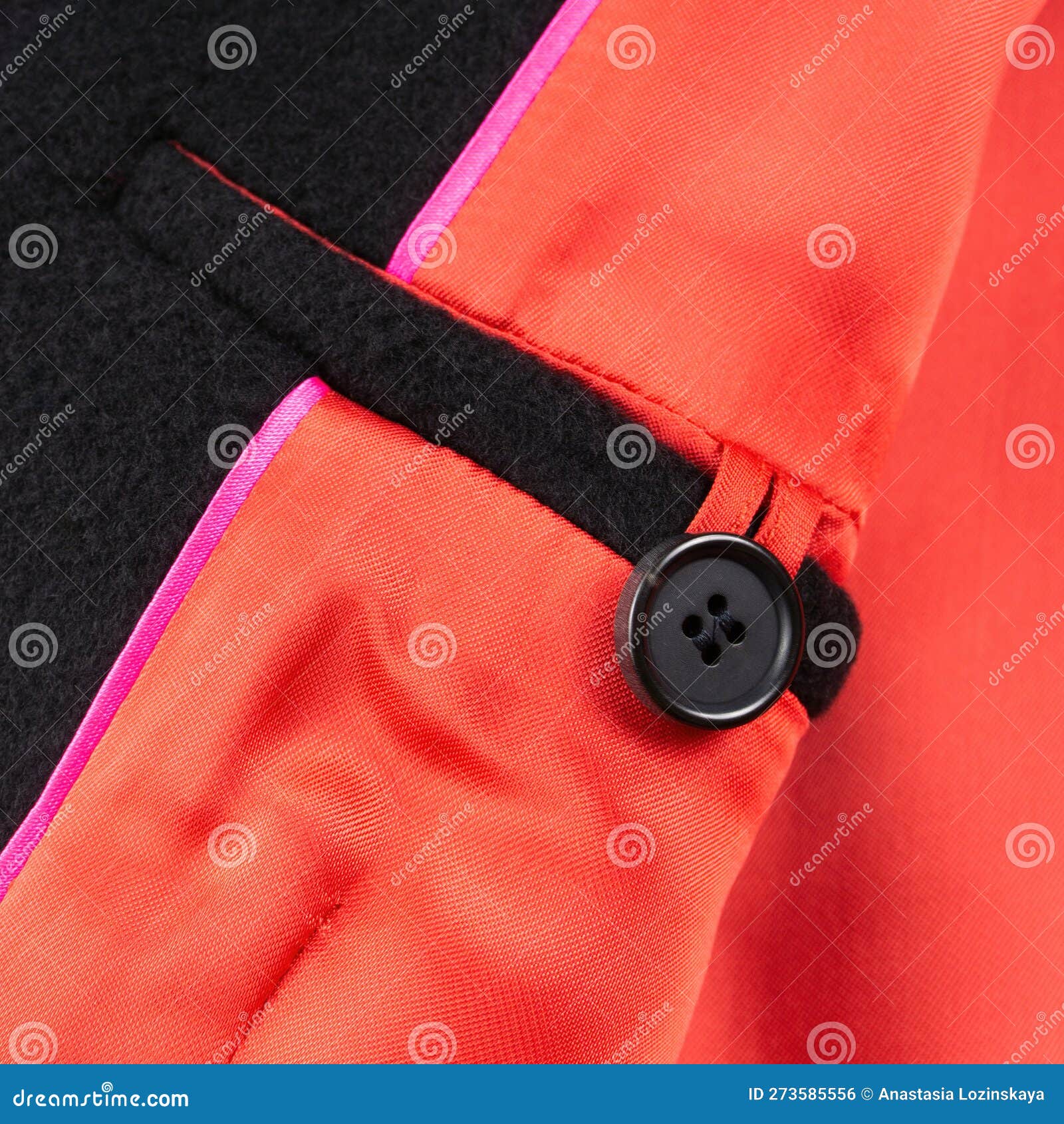 Interior Button Pocket in Black Wool Coat with Bright Red Lining. Close ...