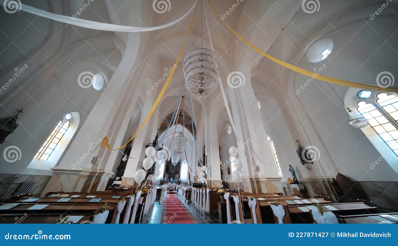 The Interior of a Catholic Church with White Balloons before the ...