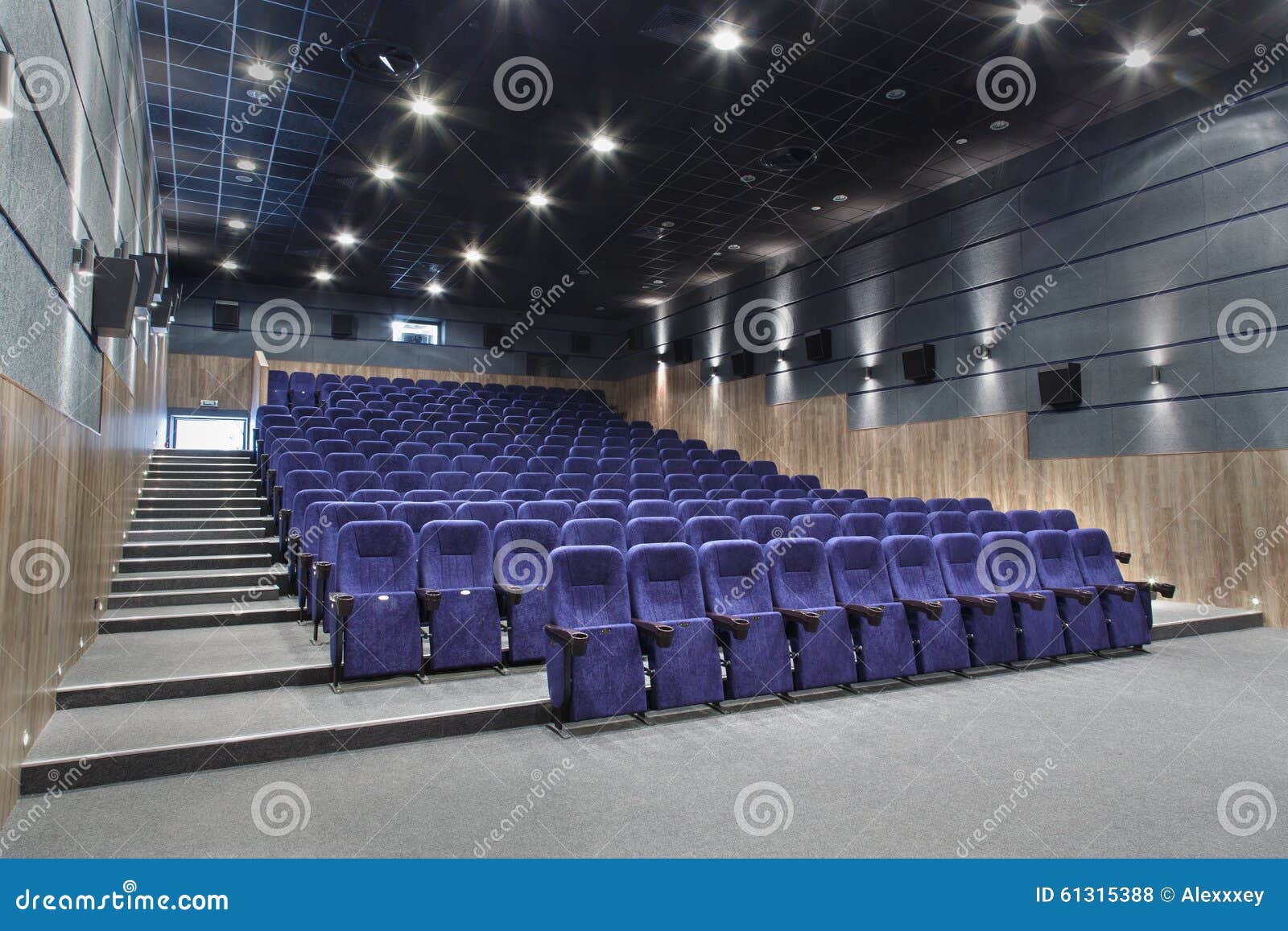 Interior Cinema Hall with Plenty of Seating and a Projector Stock Photo ...