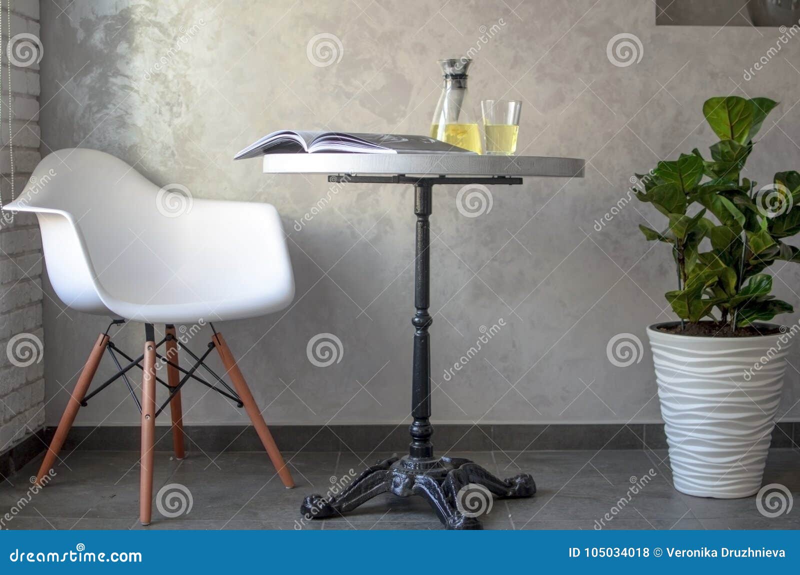 Interior in the Coffee House. White Table and Chair in the Corner of ...