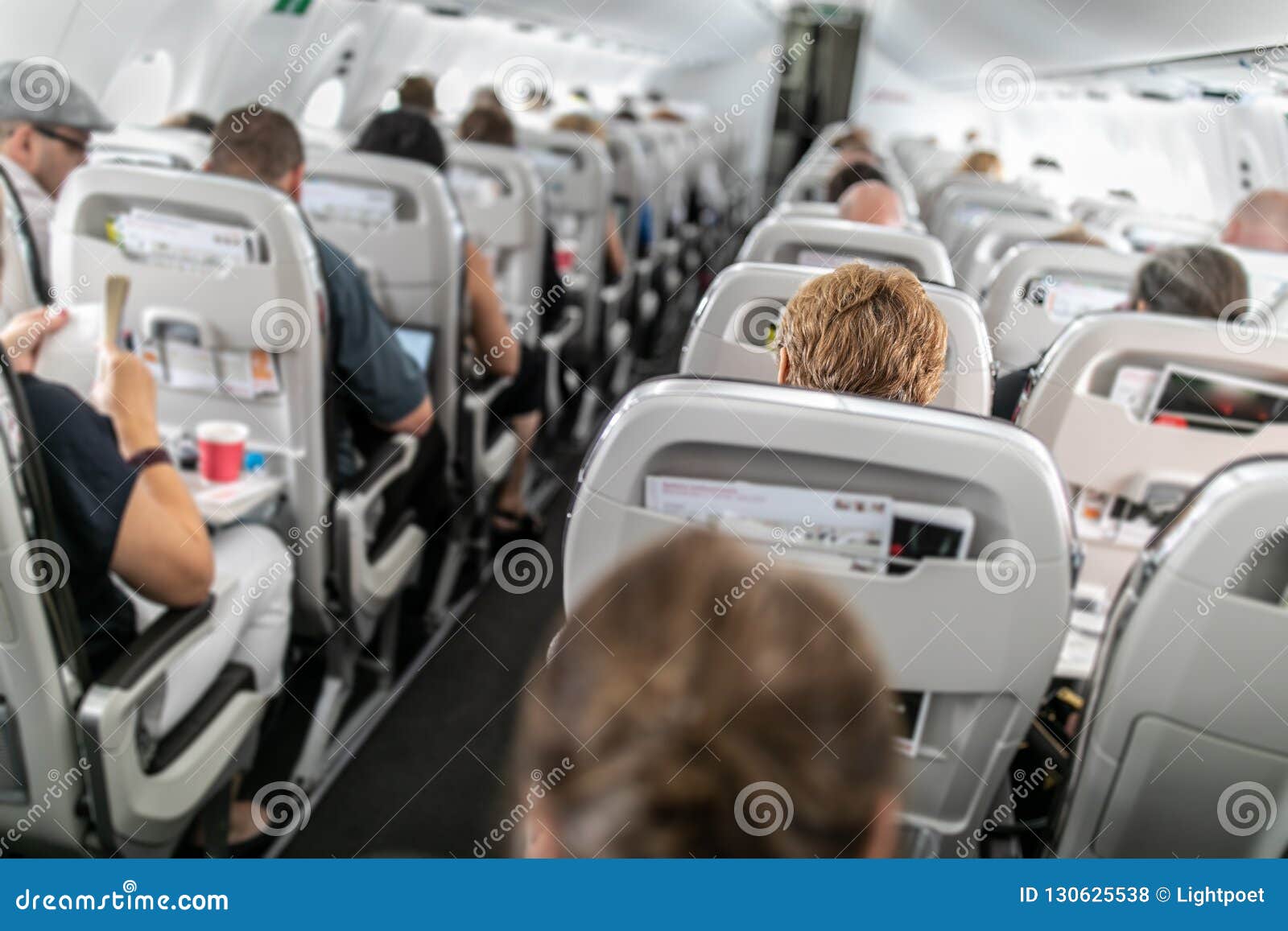 Interior of Commercial Airplane with Passengers Editorial Stock Photo ...