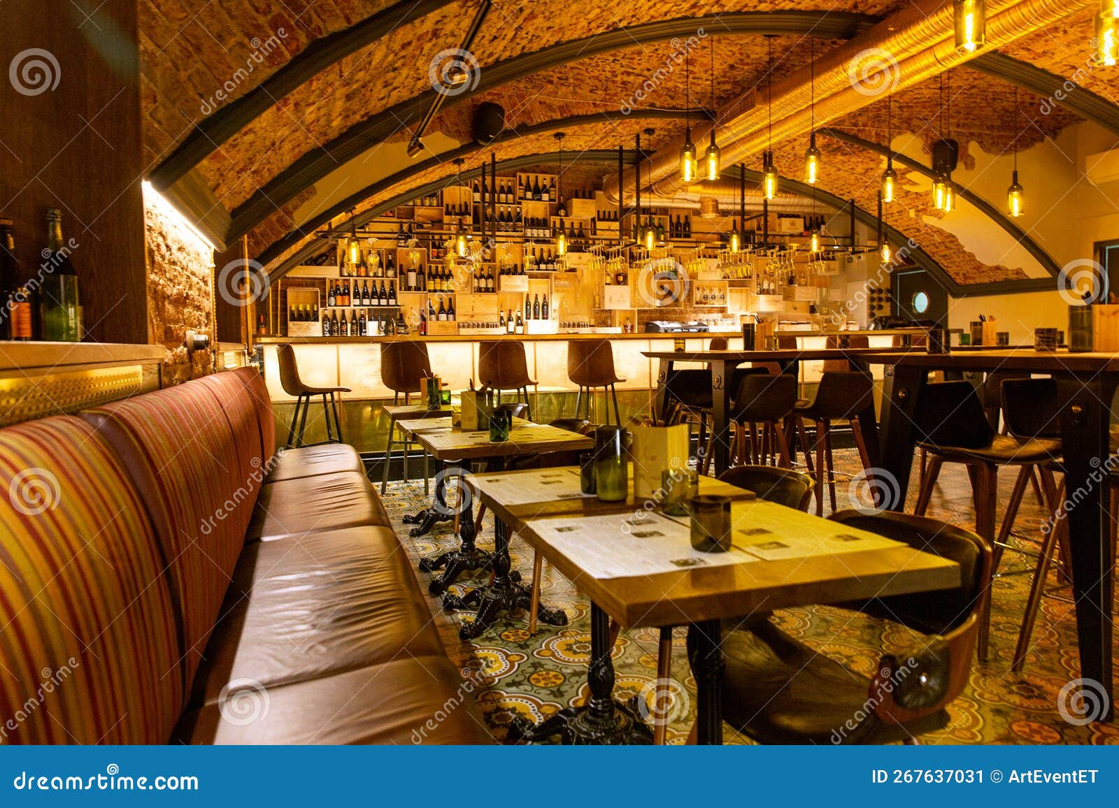 Interior of Cozy Modern Restaurant with a Bar Counter and Lamp Lighting ...