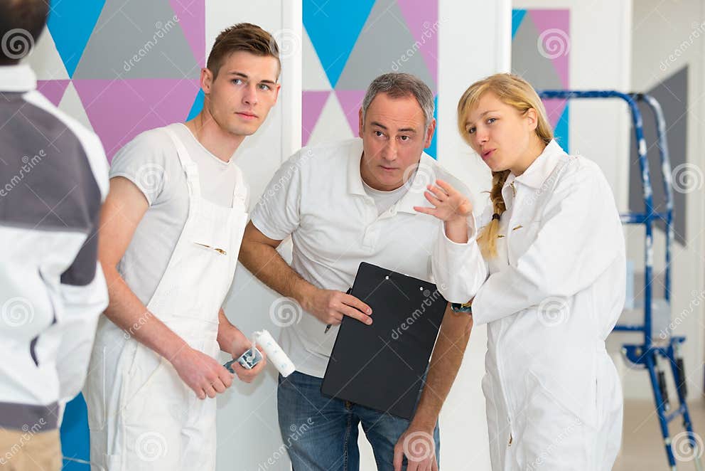 Interior Decorating Team in Discussion Stock Photo - Image of group ...