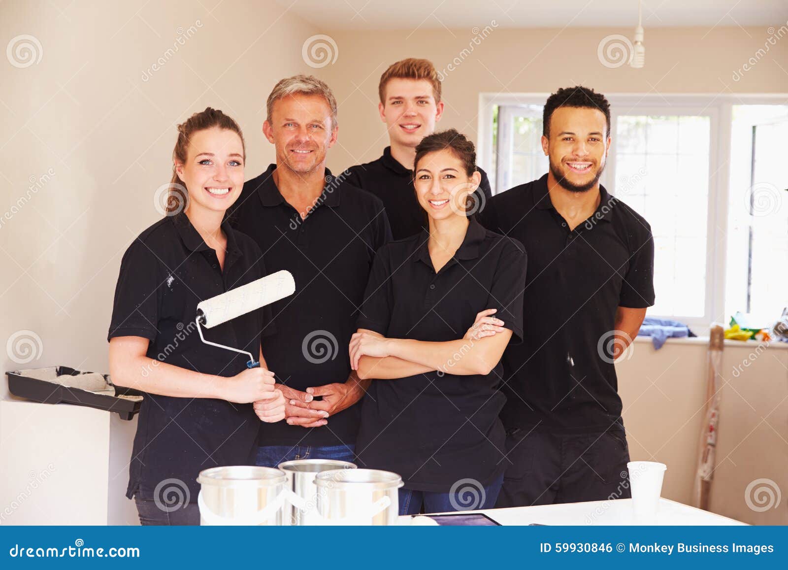 Interior Decorating Team Portrait with Paint Roller Stock Photo - Image ...