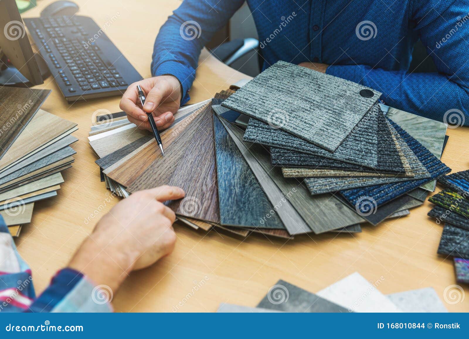 Interior Design - Customer Choosing Floor Material from Samples at ...