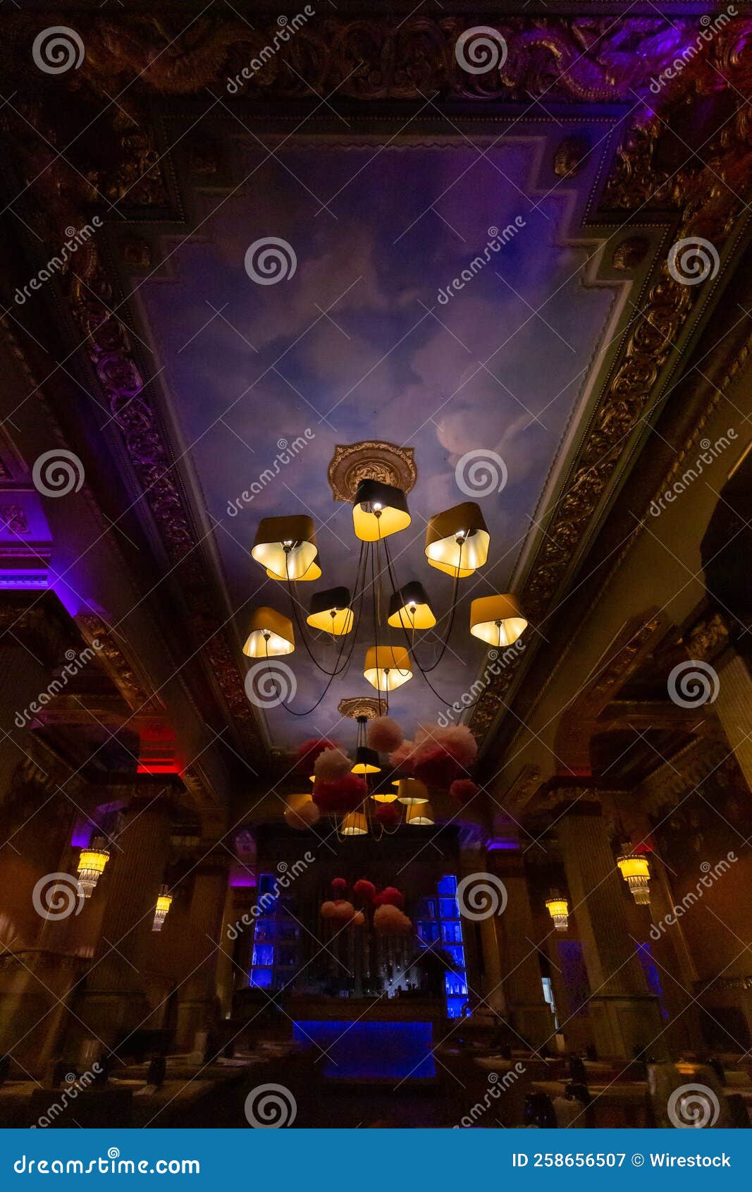 Interior Design of a Dark Room with Beautiful Chandeliers Stock Image ...