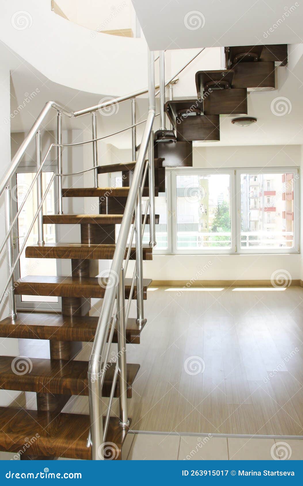 Interior Design of a Duplex Apartment with White Walls and a Brown ...